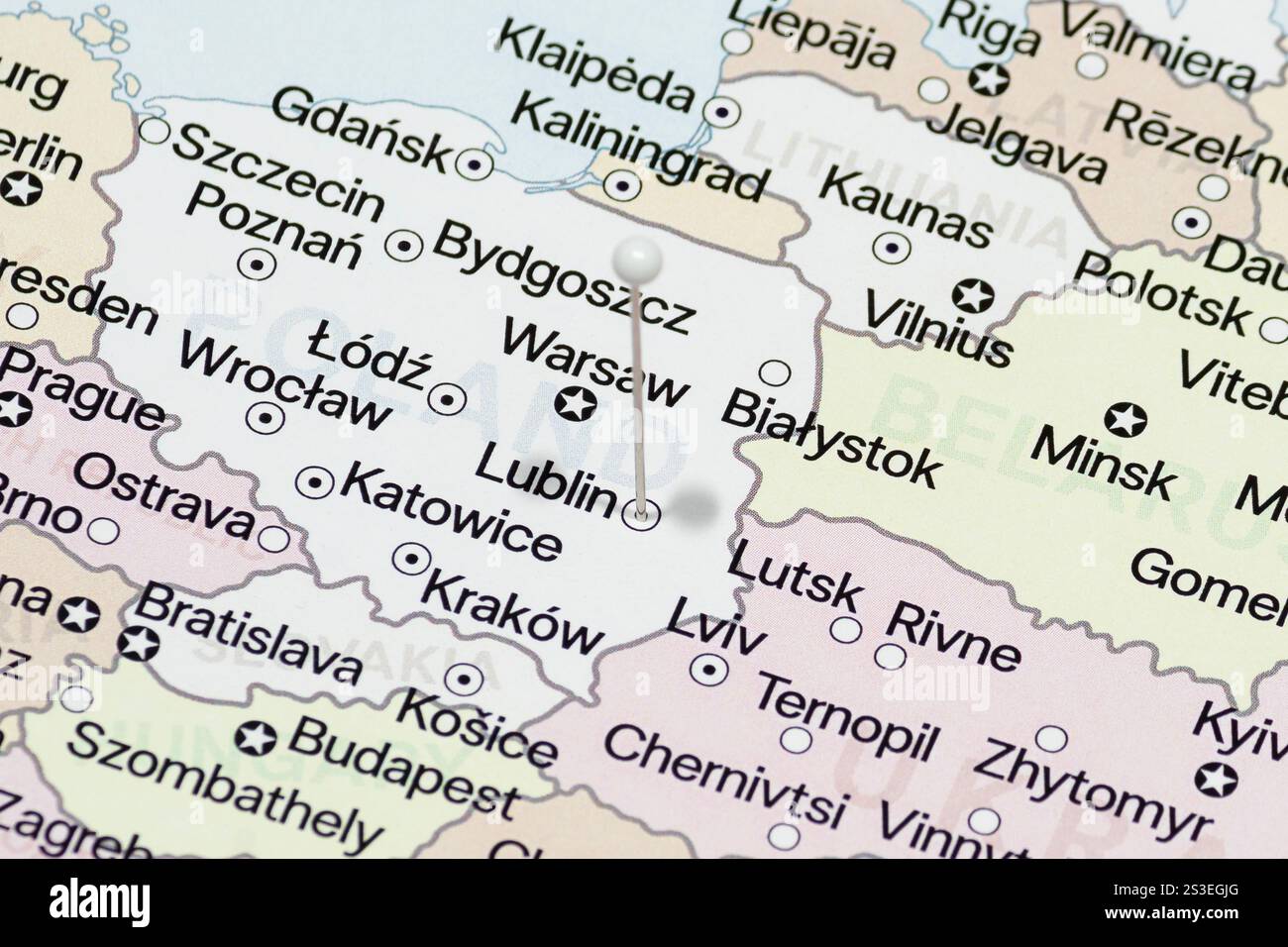 Macro photo of a white pin needle into Lublin city of Poland political ...