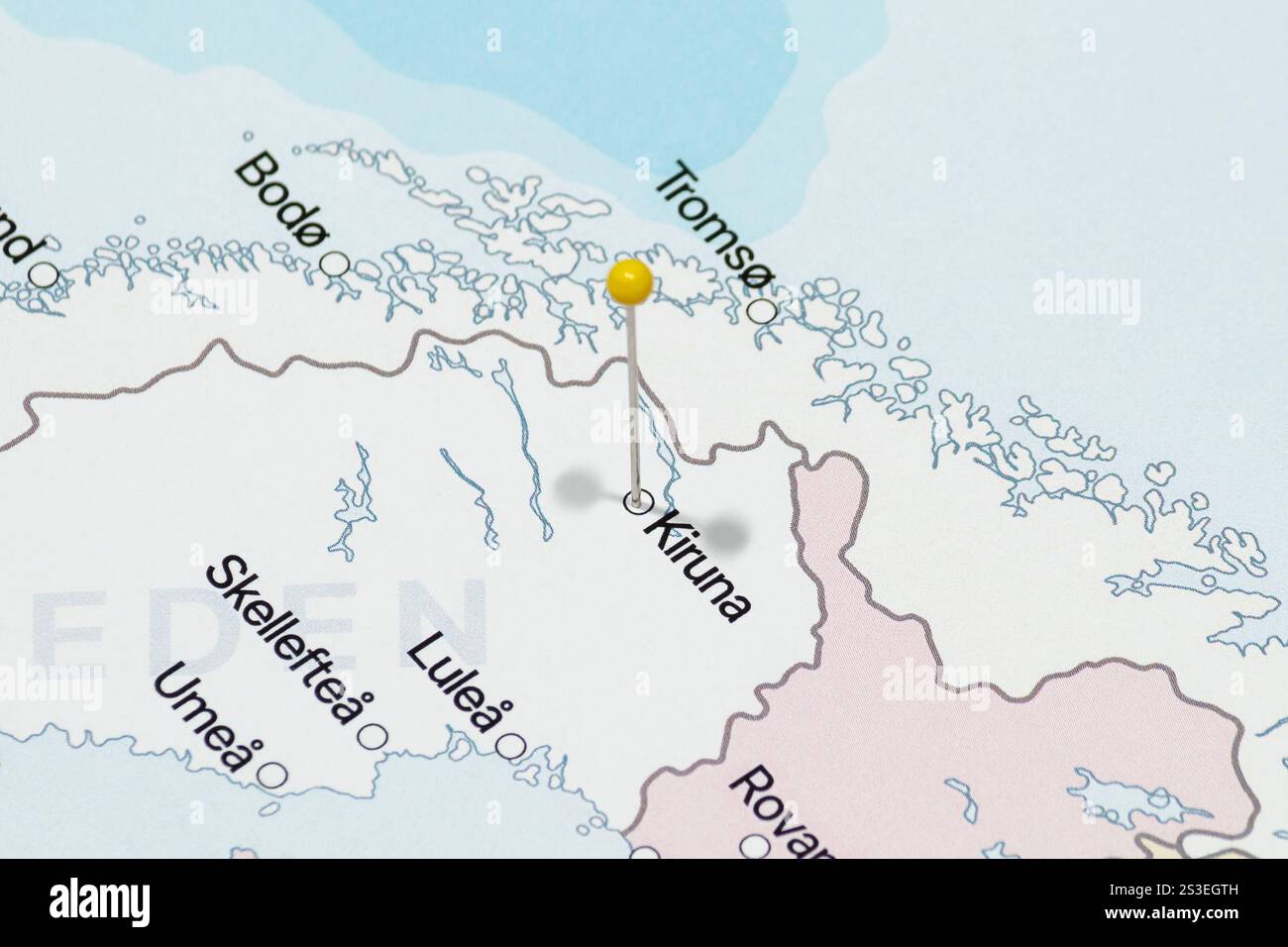 Close up to a yellow pin needle into Kiruna city of Sweden political ...