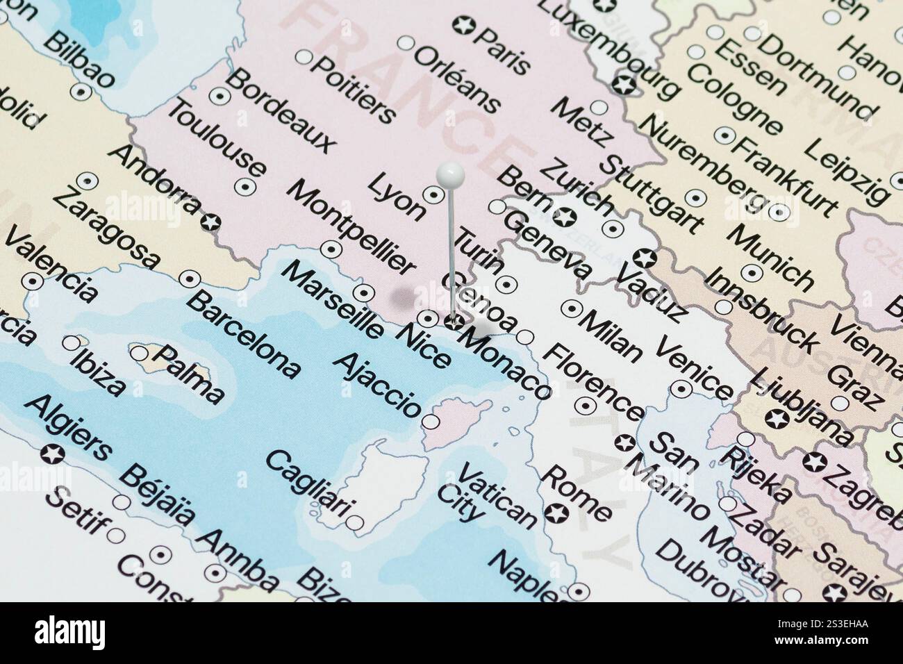 Macro photo of a white pin needle into Monaco city of Principality of ...