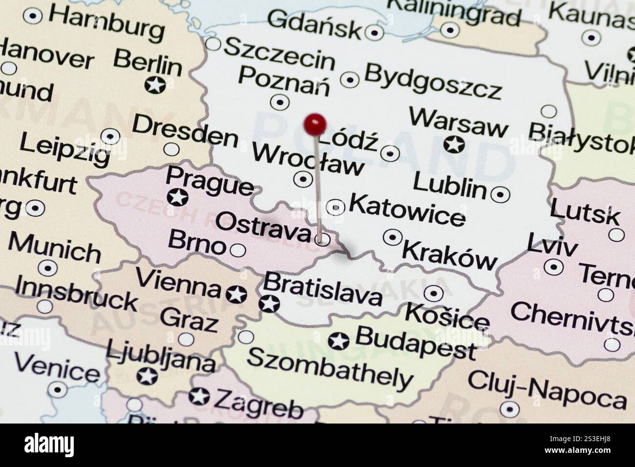 Macro photo of a red pin needle into Ostrava city of Czech Republic ...
