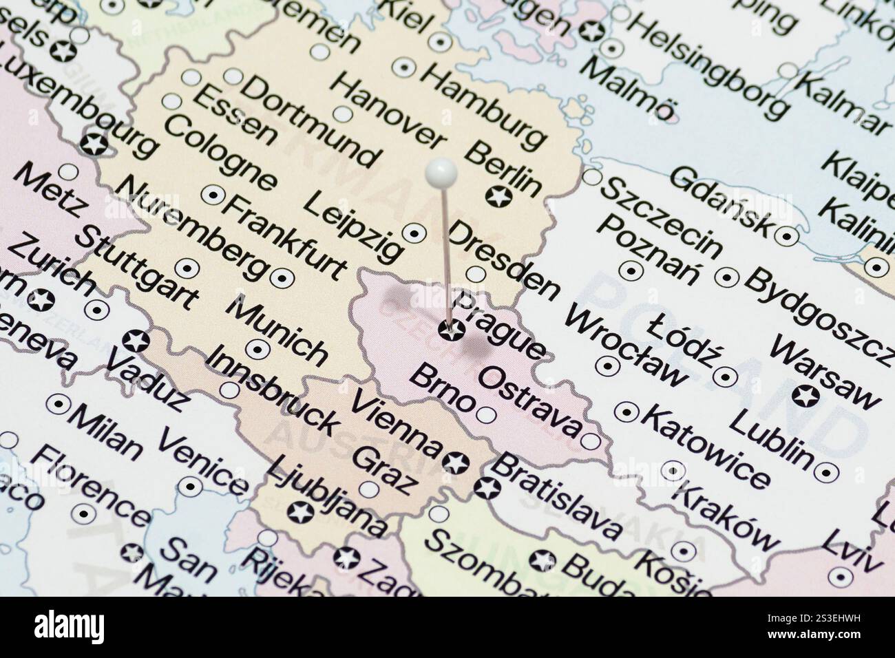 Macro photo of a white pin needle into Prague city of Czech Republic ...