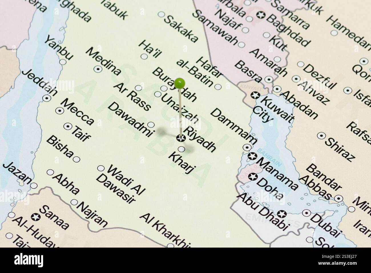 Macro photo of a green pin needle into Riyadh city of Saudi Arabia ...