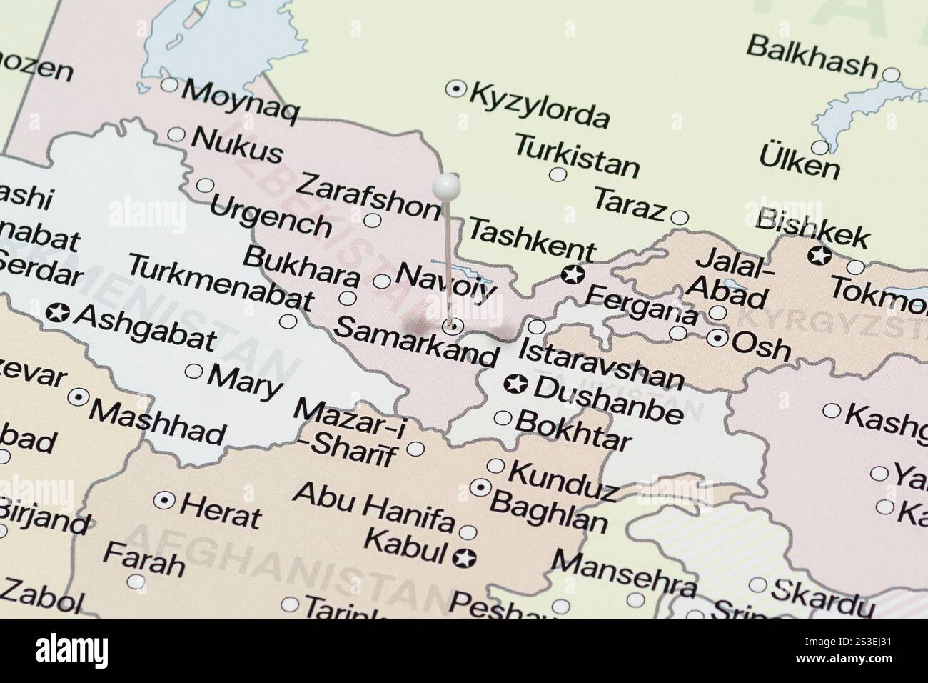 Macro photo of a white pin needle into Samarkand city of Uzbekistan ...