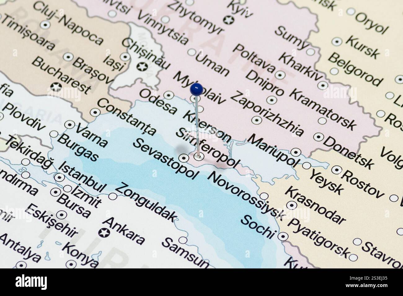 Macro photo of a blue pin needle into Simferopol city of Ukraine ...