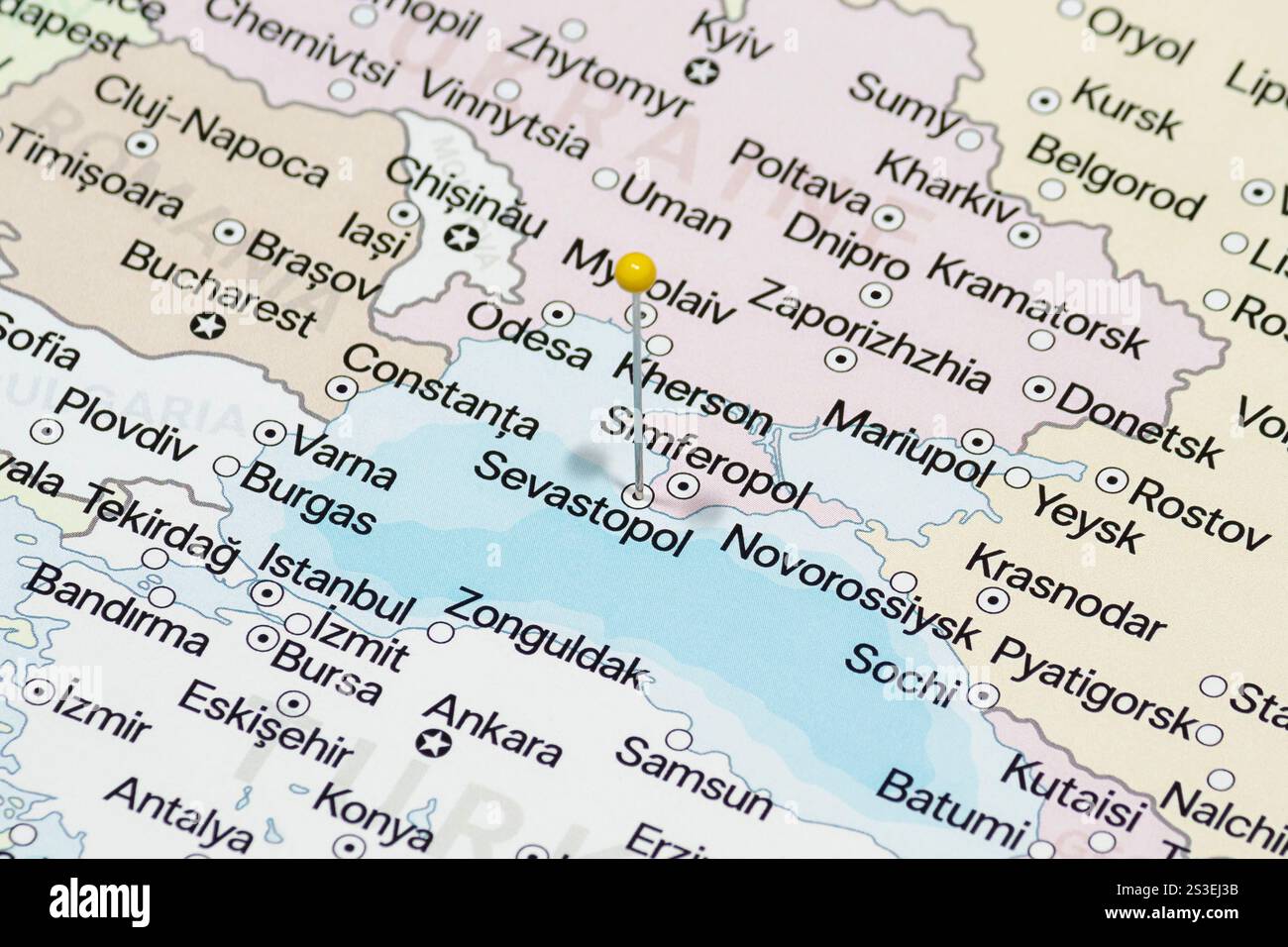 Macro photo of a yellow pin needle into Sevastopol city of Ukraine ...