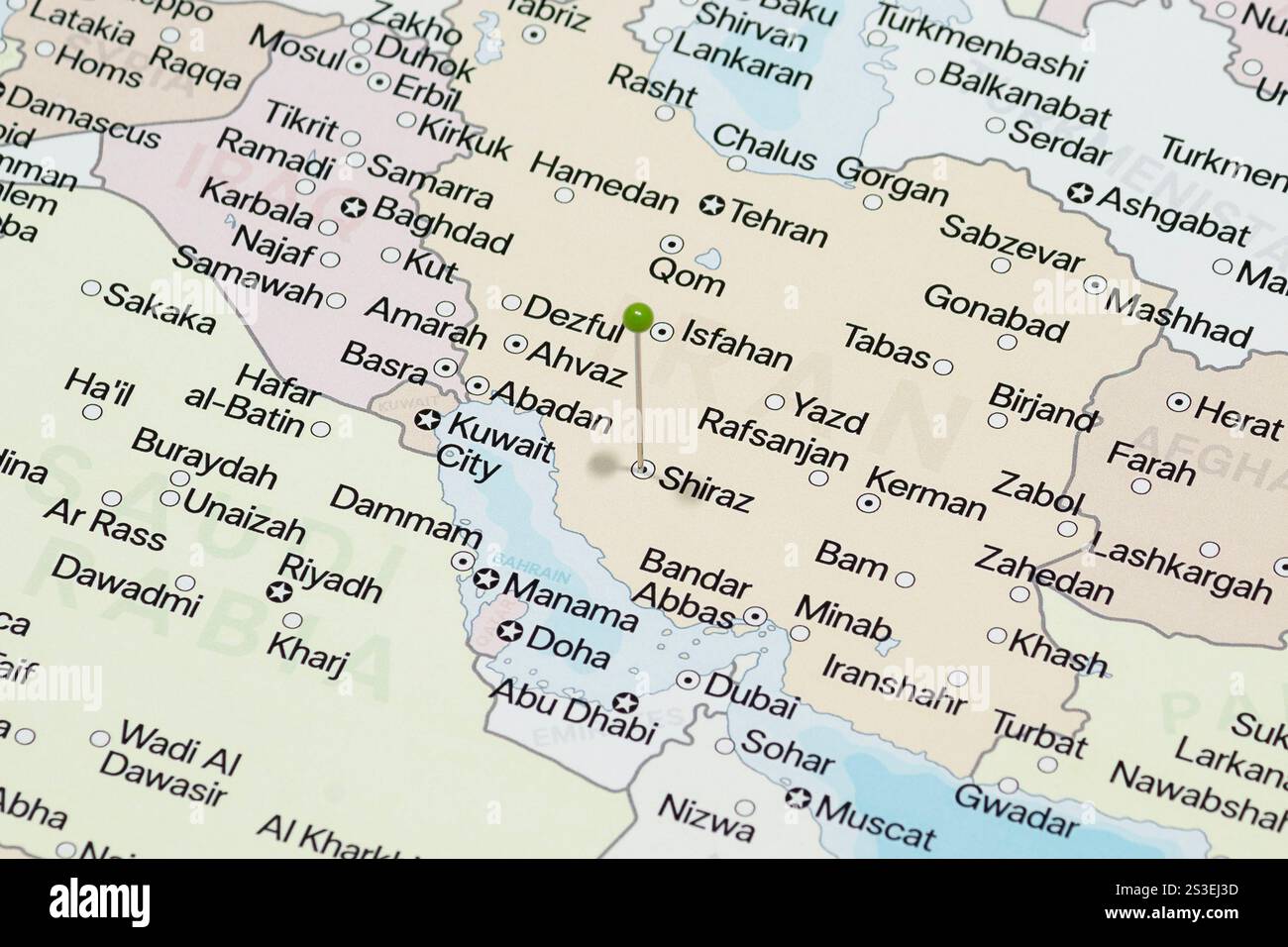 Macro photo of a green pin needle into Shiraz city of Iran political ...