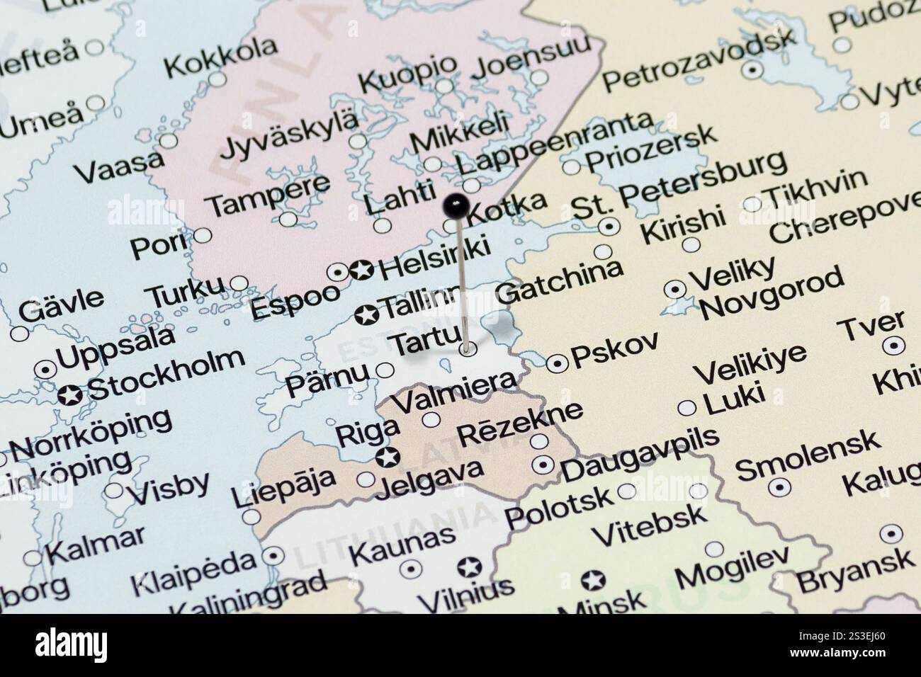 Macro photo of a black pin needle into Tartu city of Estonia political ...