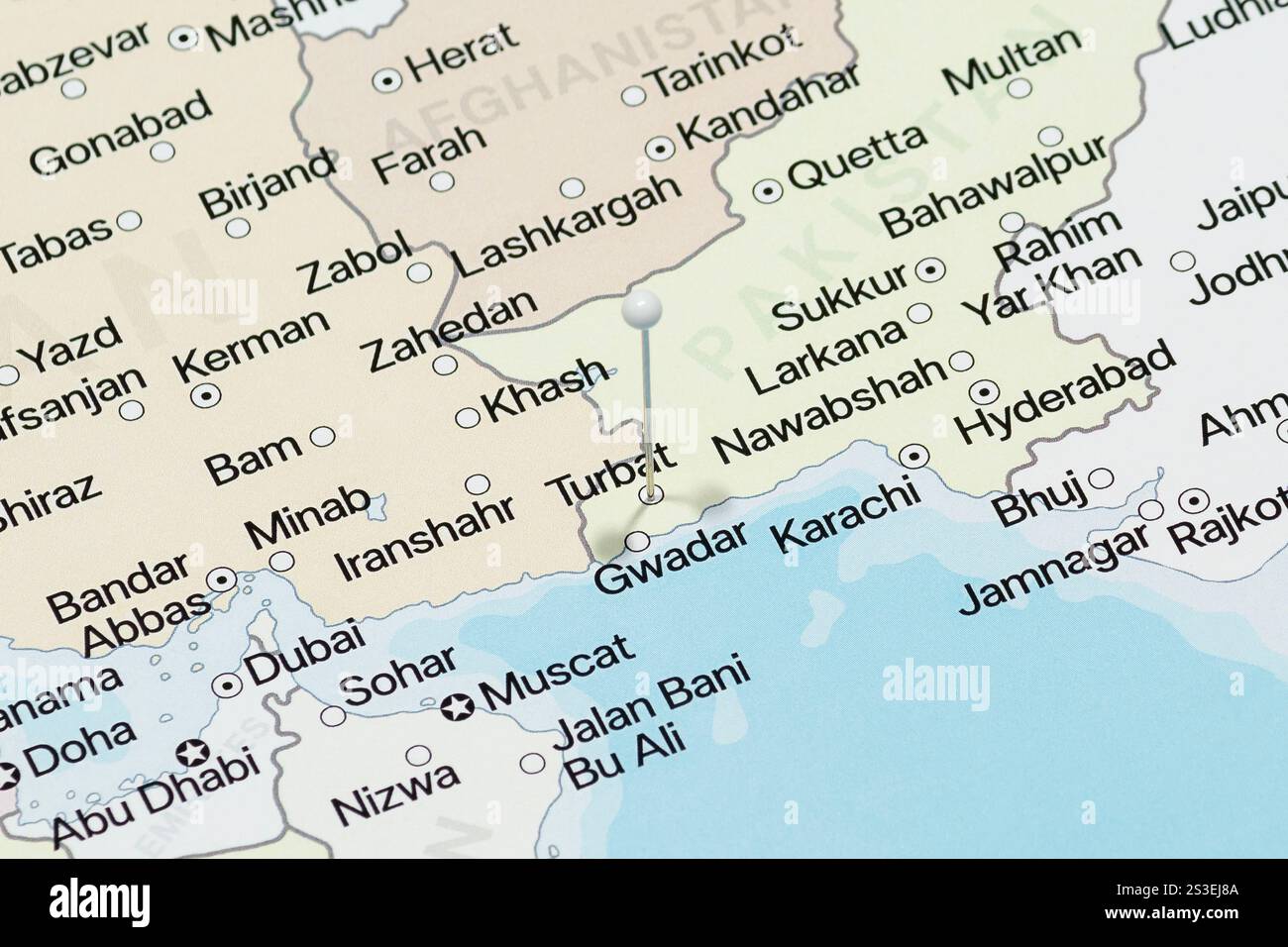 Macro photo of a white pin needle into Turbat city of Pakistan ...