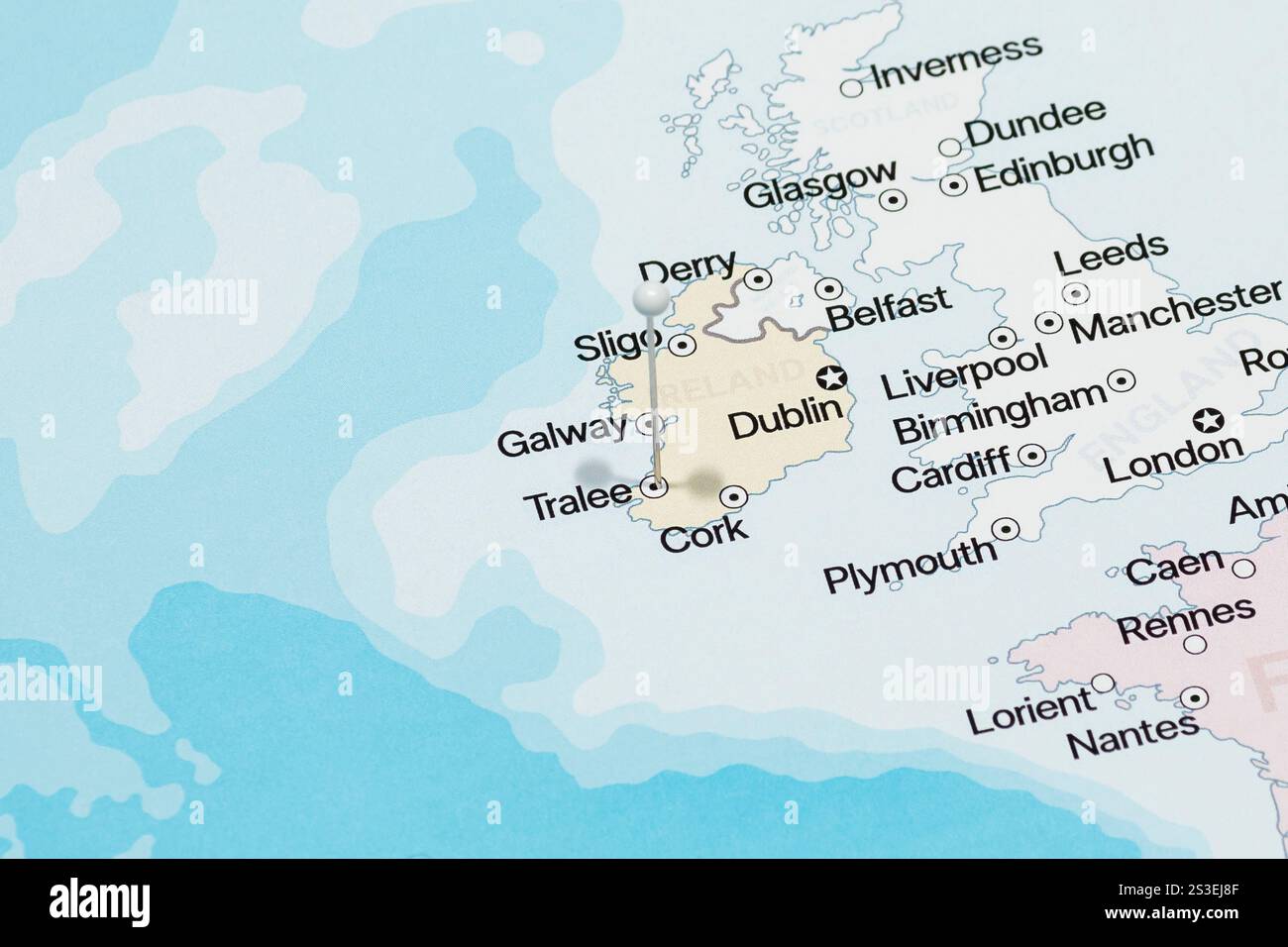 Macro photo of a white pin needle into Tralee city of Ireland political ...