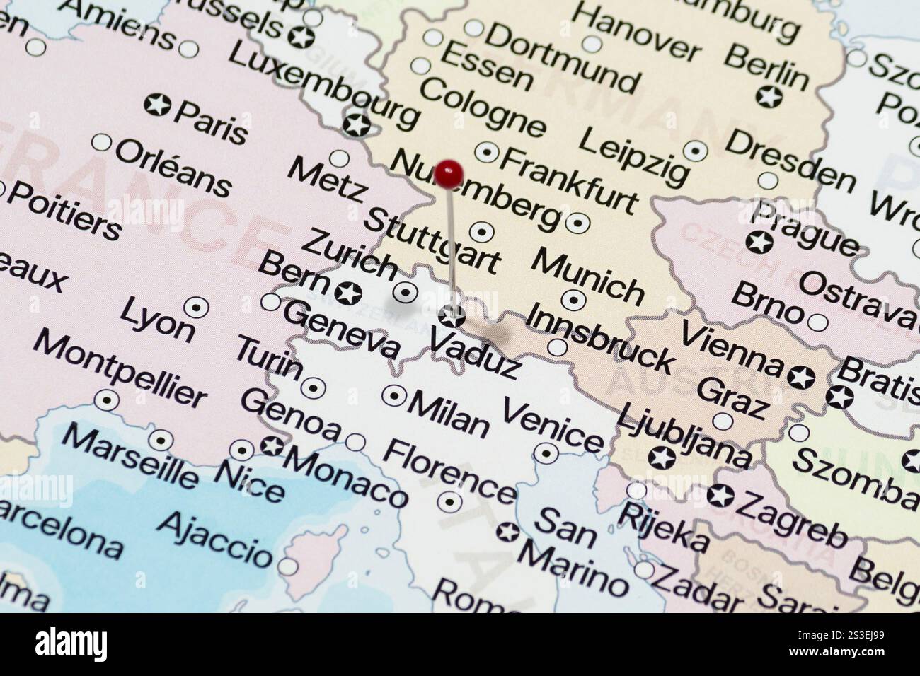 Macro photo of a red pin needle into Vaduz city of Liechtenstein ...