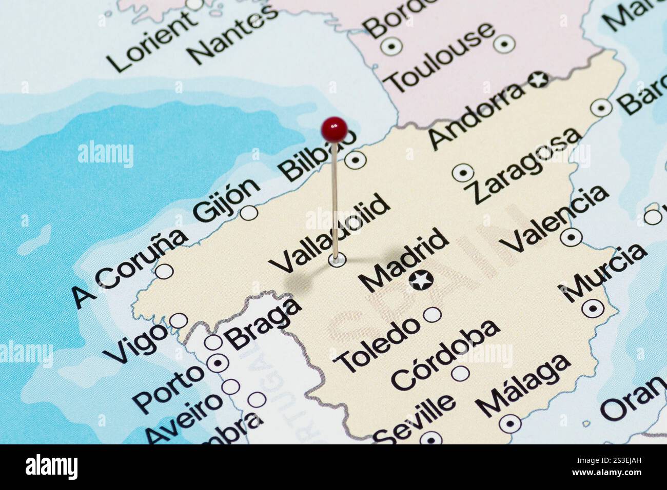 Macro photo of a red pin needle into Valladolid city of Spain political ...