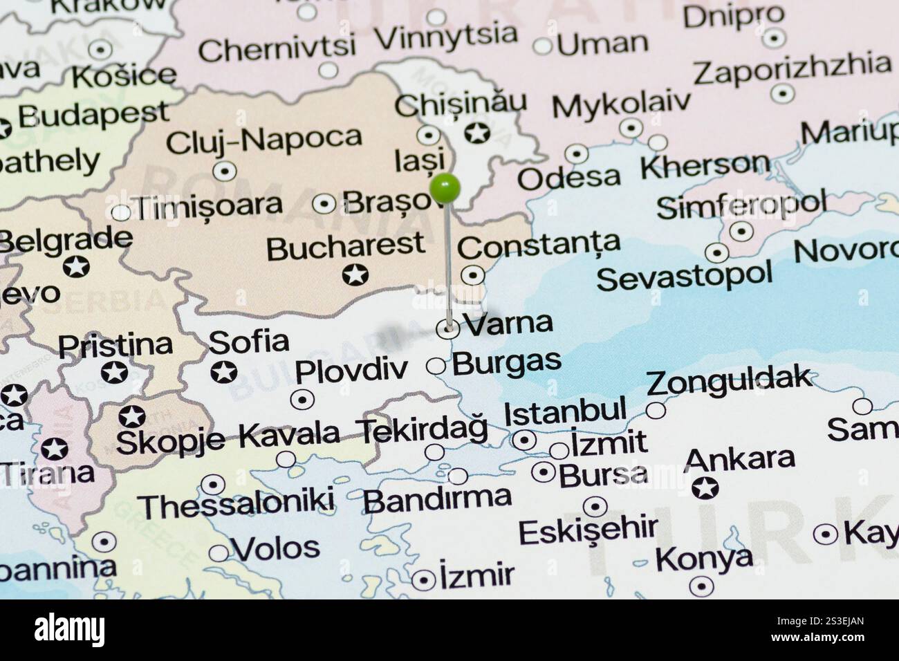 Macro photo of a green pin needle into Varna city of Bulgaria political ...