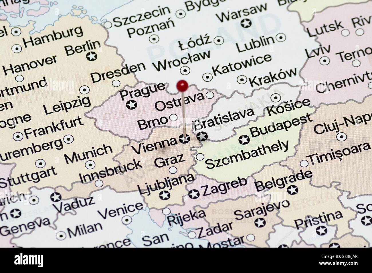 Macro photo of a red pin needle into Vienna city of Austria political ...