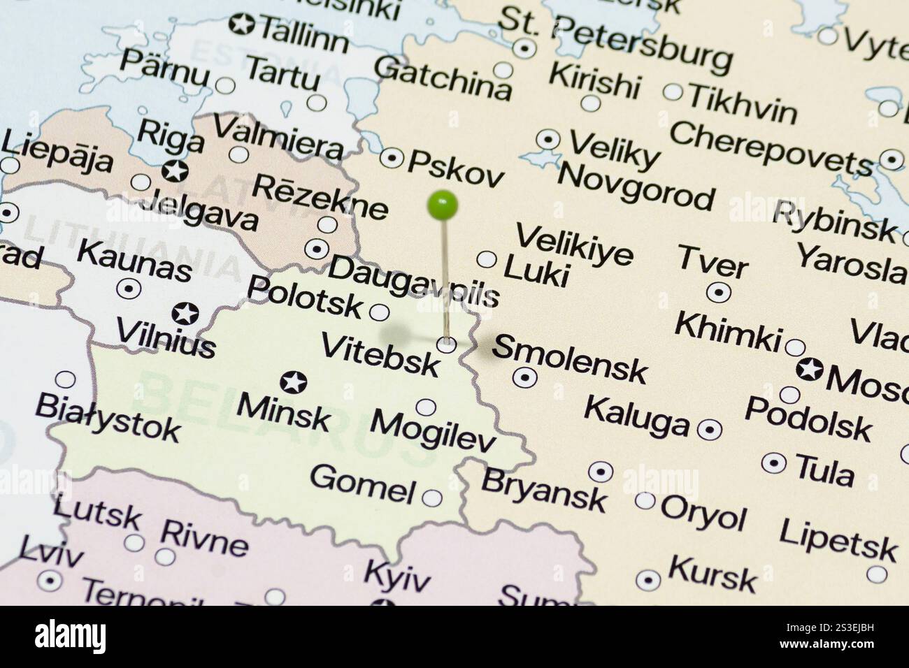 Macro photo of a green pin needle into Vitebsk city of Belarus ...