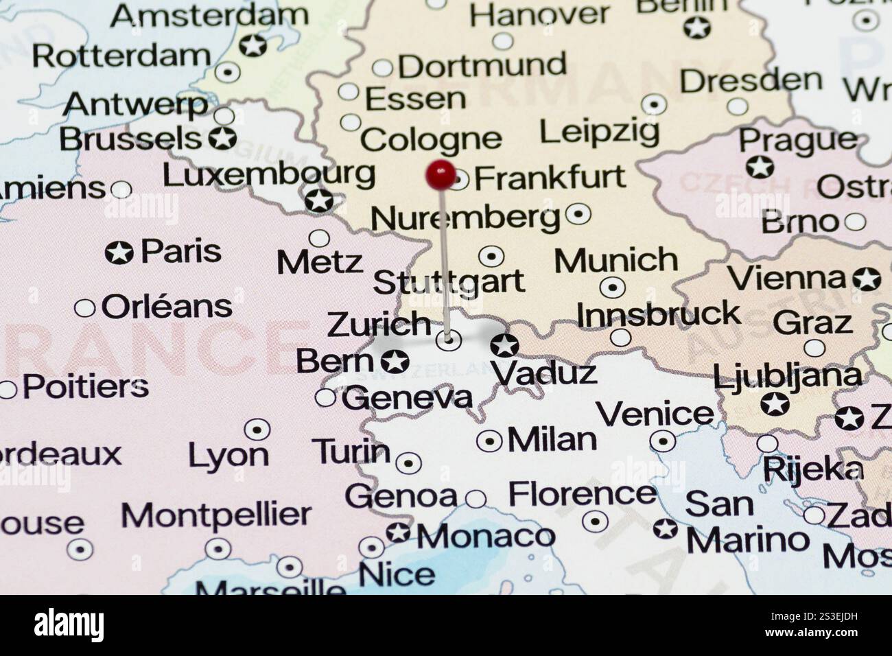 Macro photo of a red pin needle into Zurich city of Switzerland ...