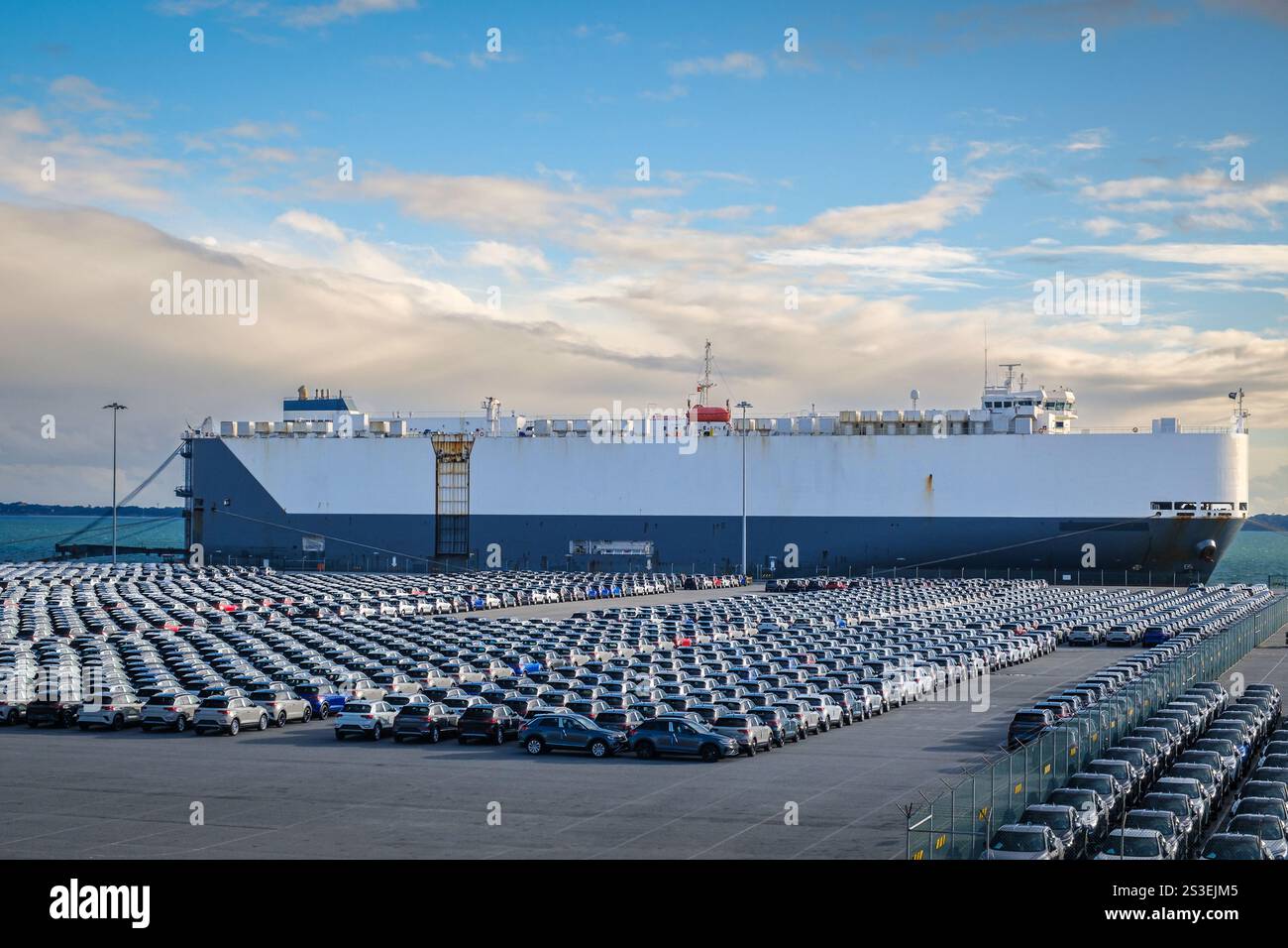 Large vehicle carrier ship known as RO-RO at port on sunny day, large ...