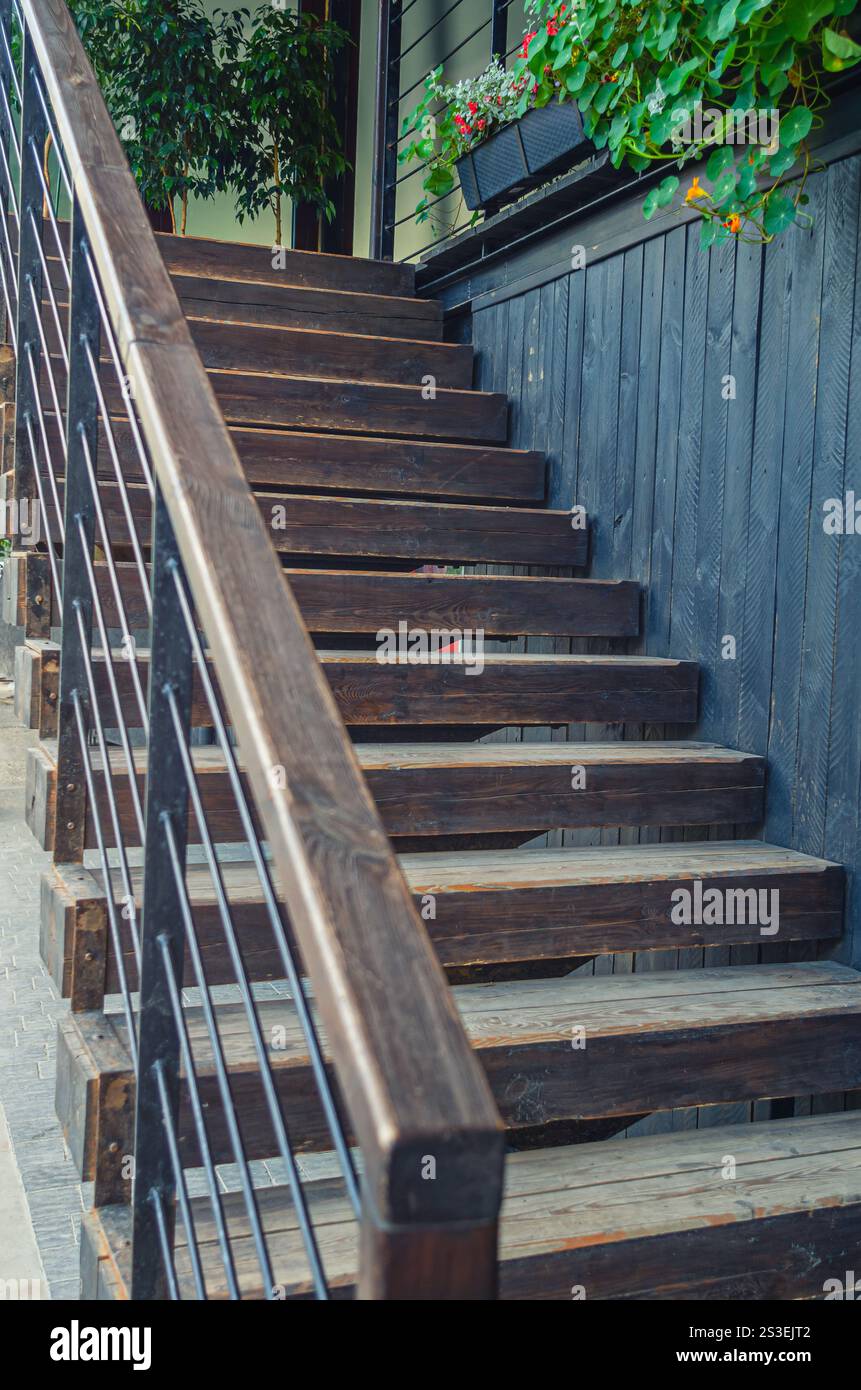 Wooden stairs in the interior of the restaurant Stock Photo - Alamy
