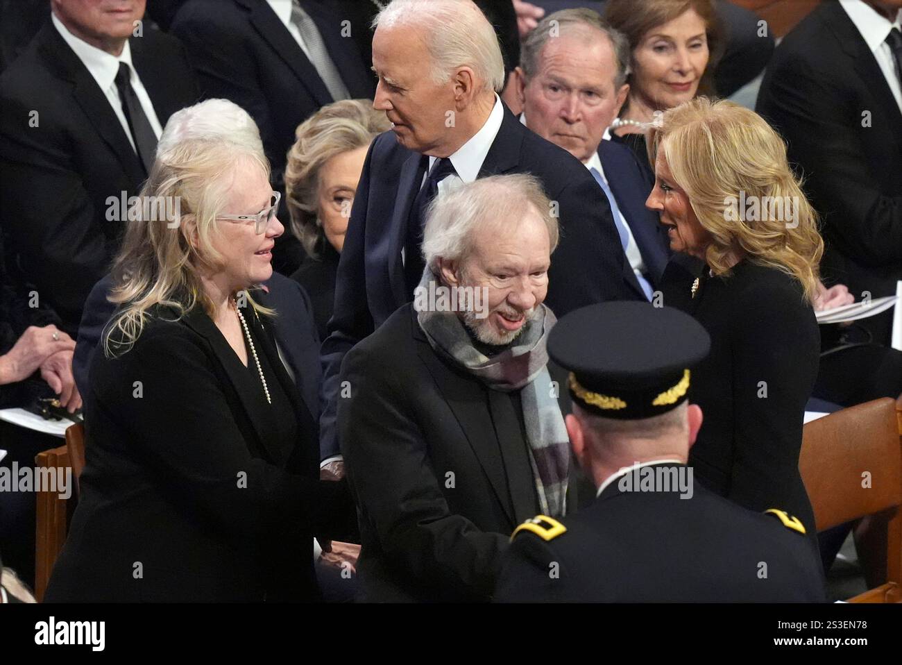 President Joe Biden and first lady Jill Biden greet Amy Carter and Jeff Carter before the state ...