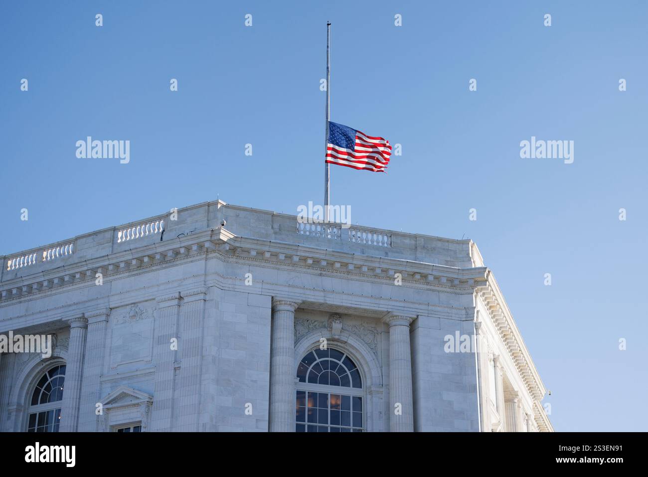 A US Flag on the Hart Senate Office Building flies at half staff, as ...