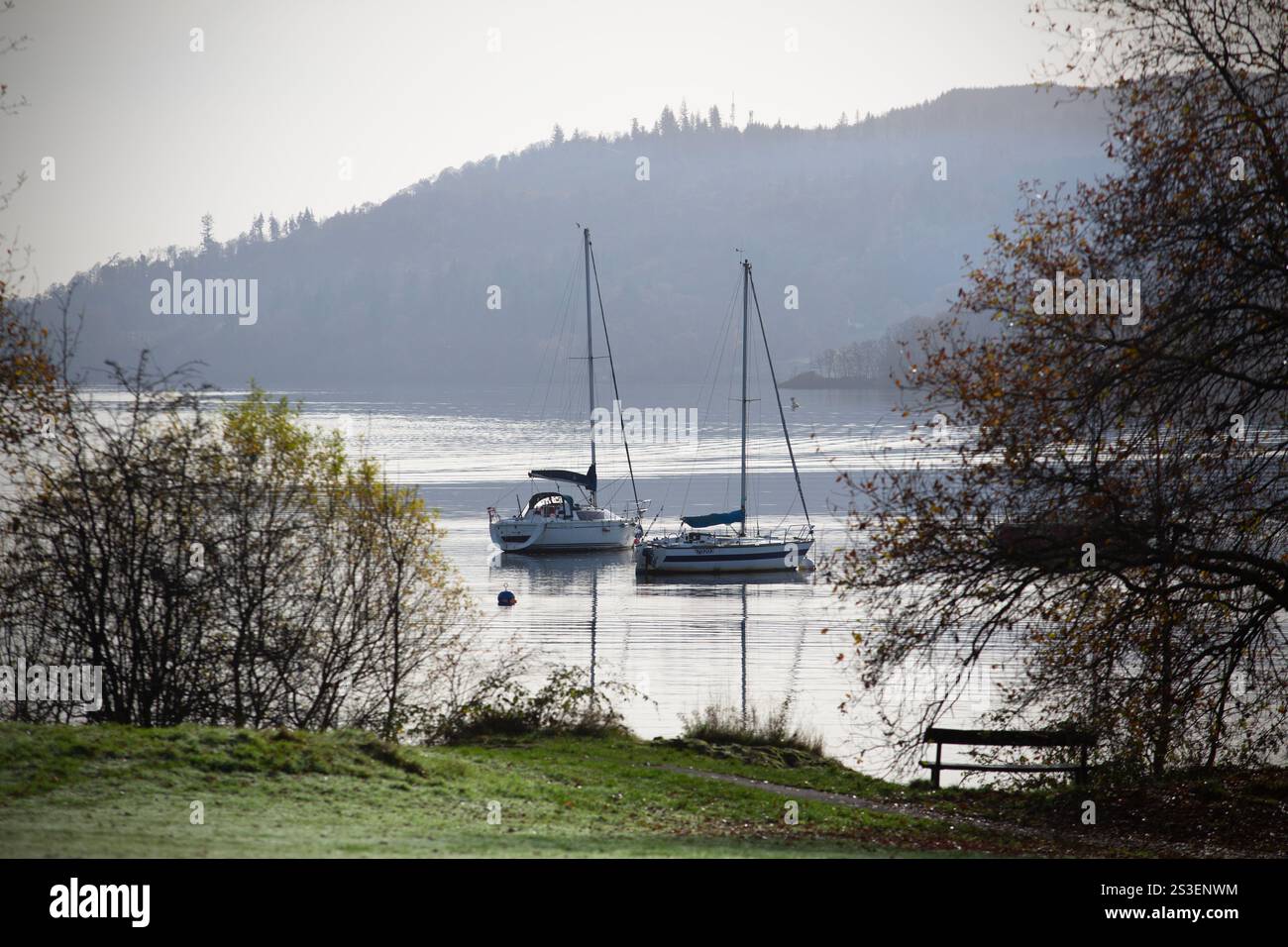 Sailing boats on Lake Windermere in the Lake District in England where ...