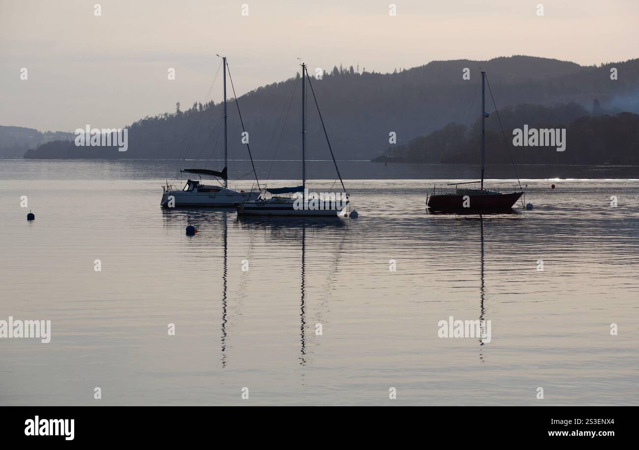 Sailing boats on Lake Windermere in the Lake District in England where ...
