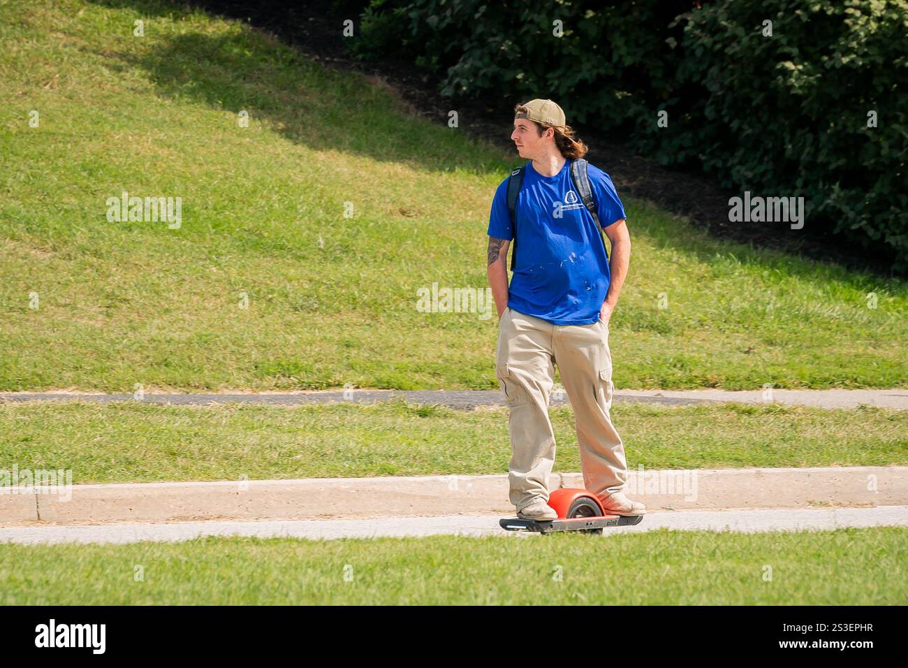 A man rides a One Wheel electric vehicle Stock Photo - Alamy