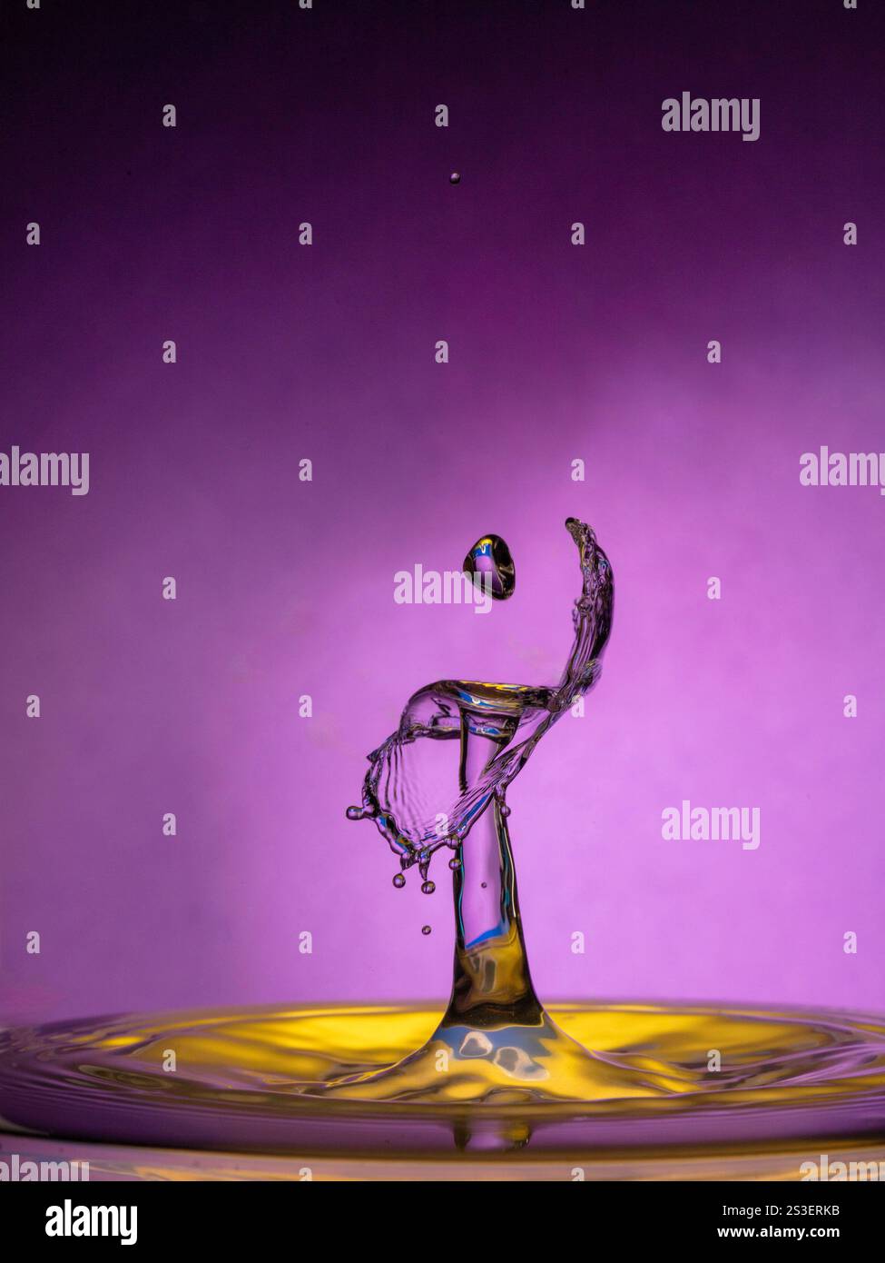 Arresting, ethereal, colour infused, imaginative water collision, macro ...