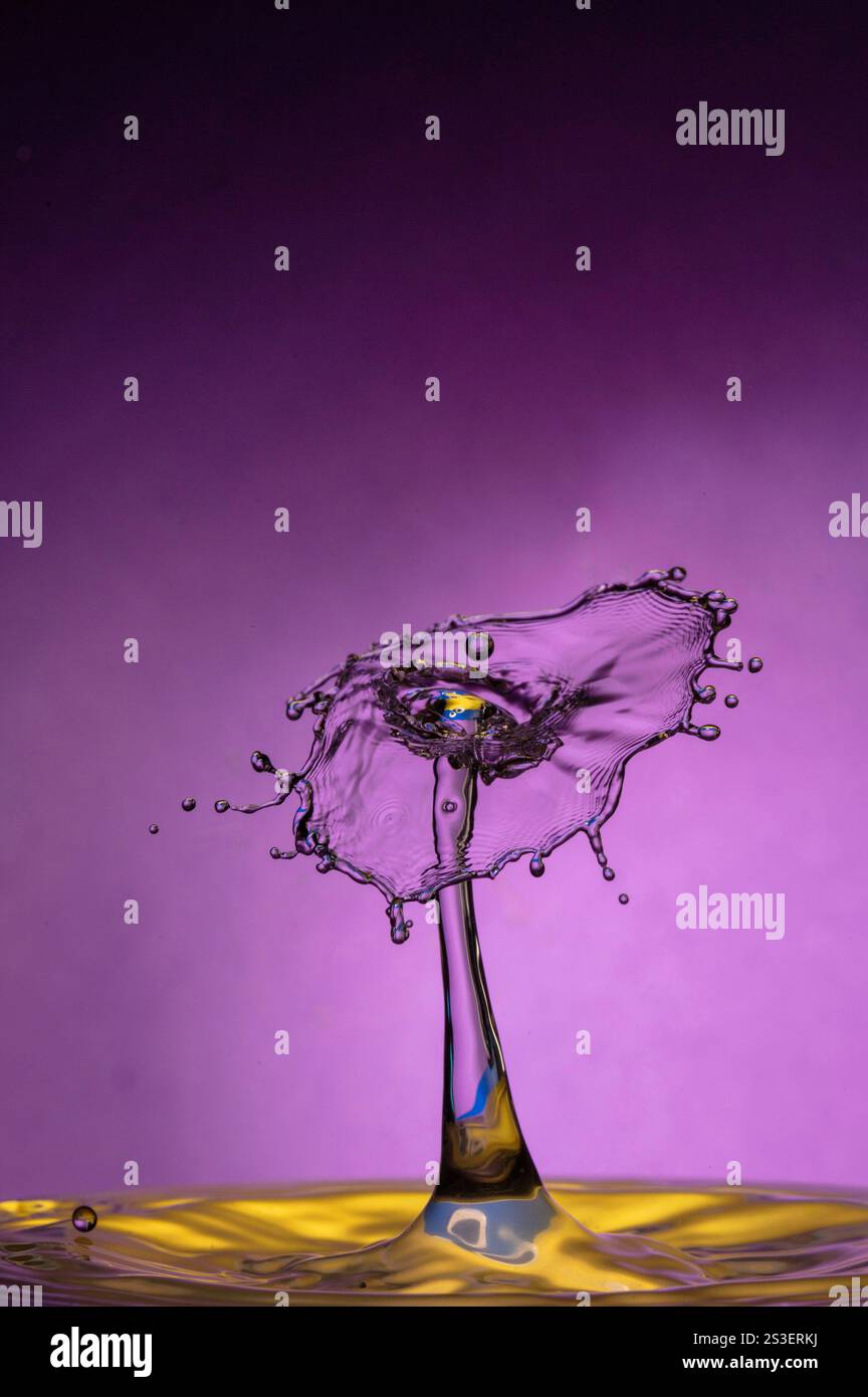 Arresting, ethereal, colour infused, imaginative water collision, macro ...