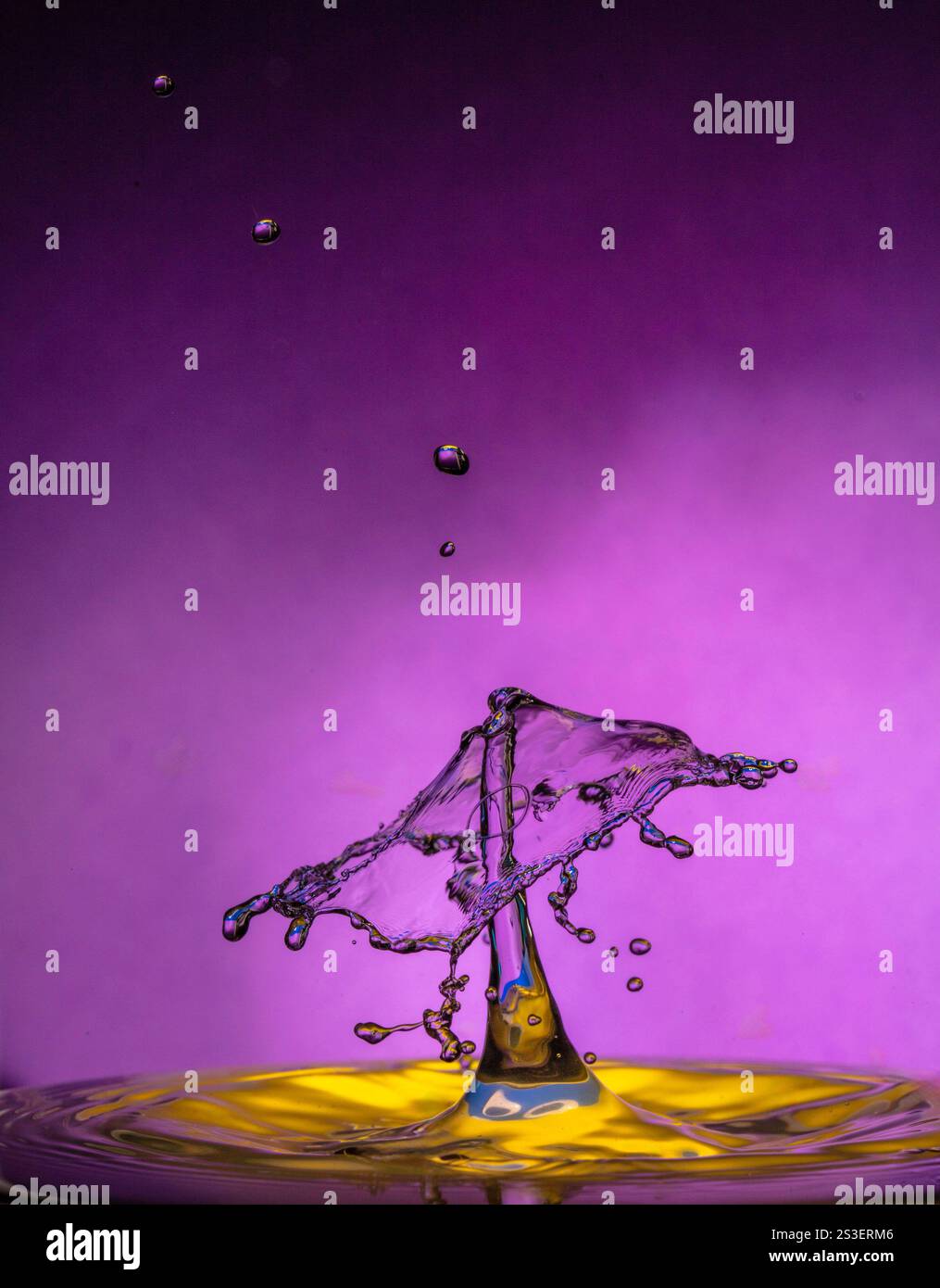 Arresting, ethereal, colour infused, imaginative water collision, macro ...