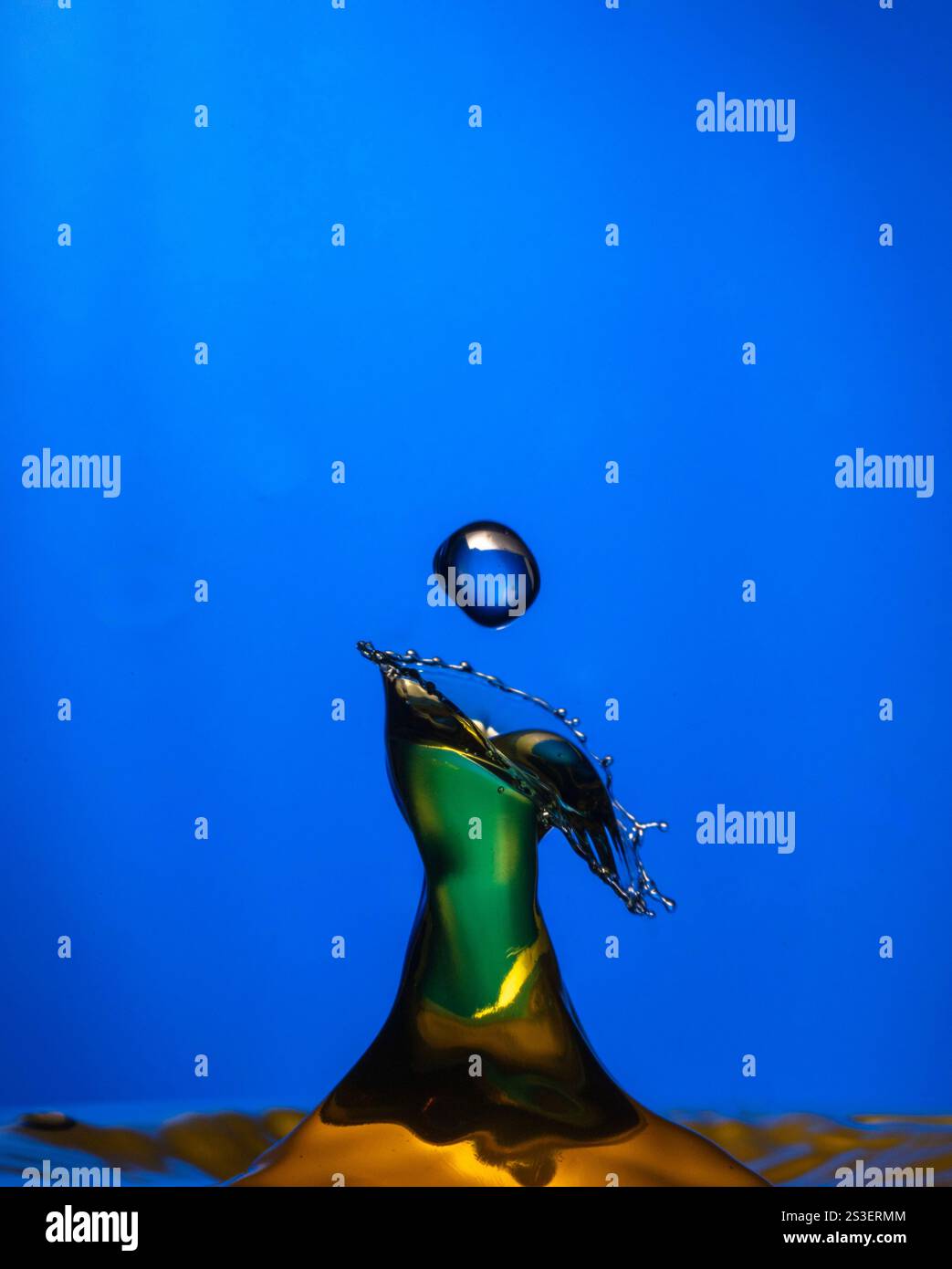 Arresting, ethereal, colour infused, imaginative water collision, macro ...