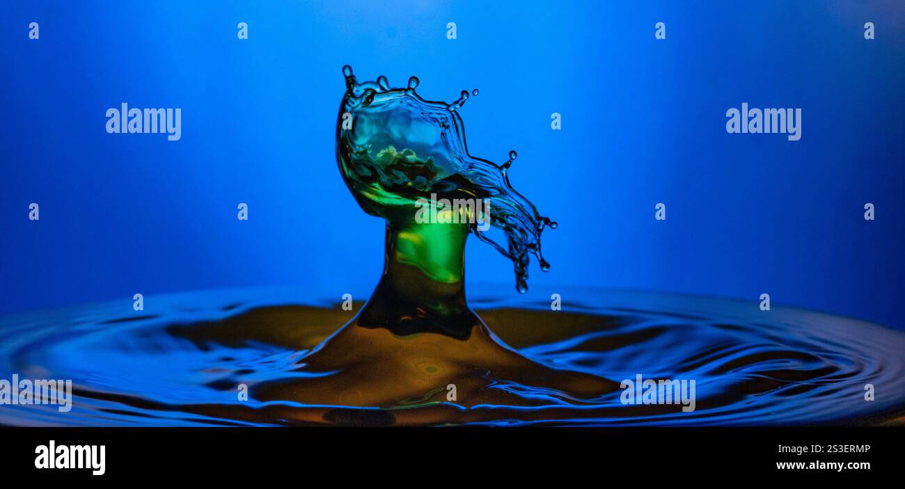 Arresting, ethereal, colour infused, imaginative water collision, macro ...