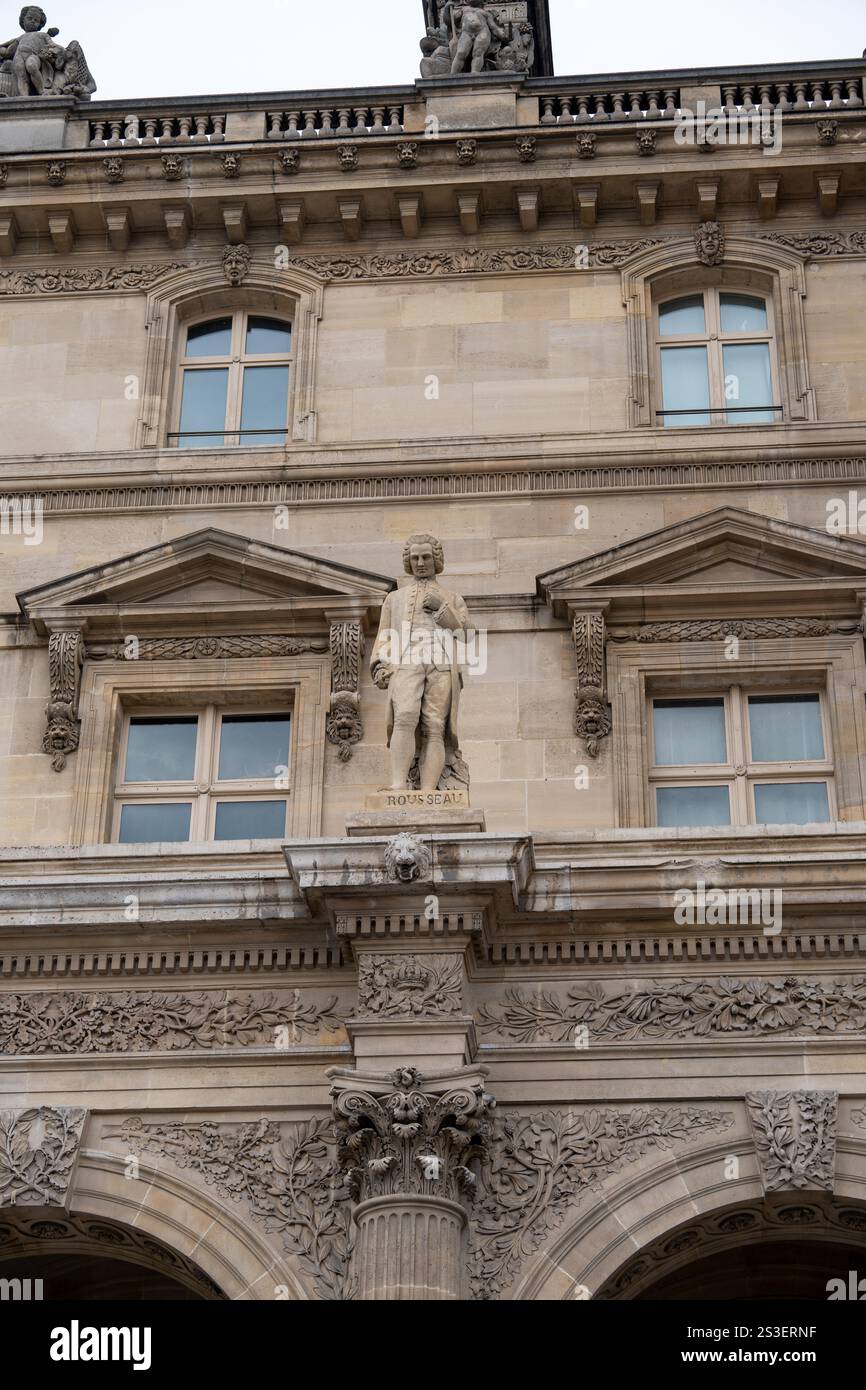 Sculpture on the facade of a historic building with intricate ...