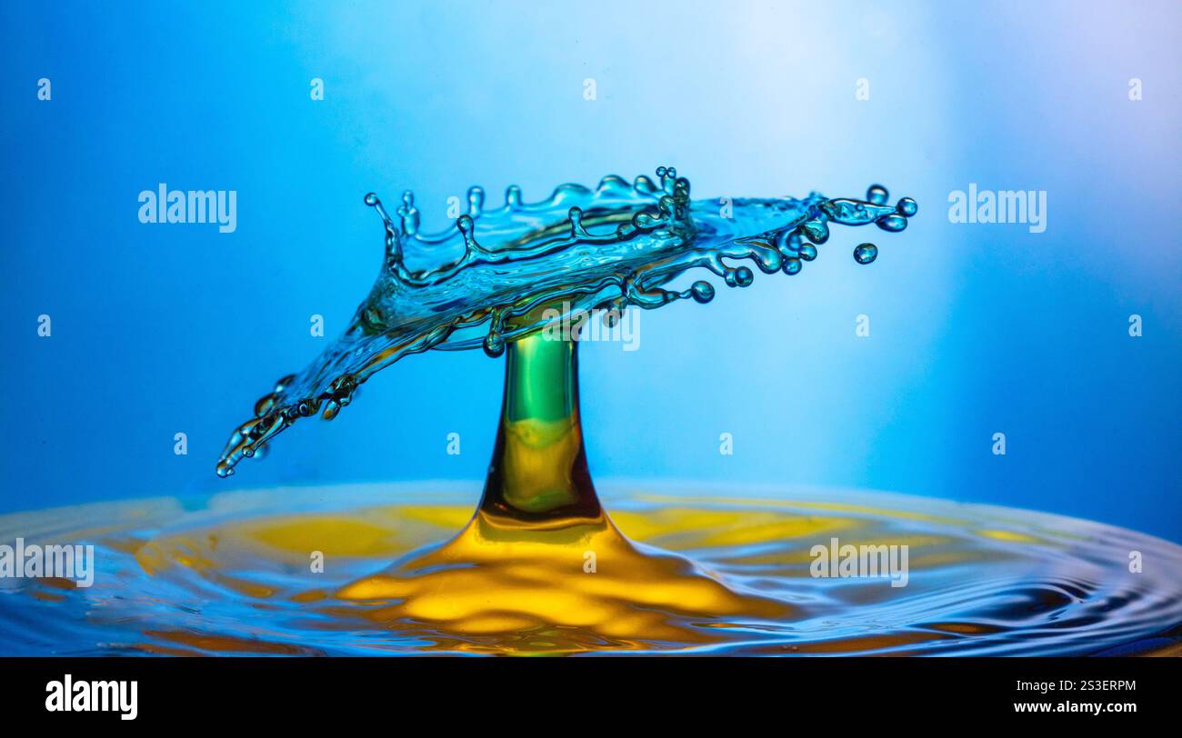 Arresting, ethereal, colour infused, imaginative water collision, macro ...