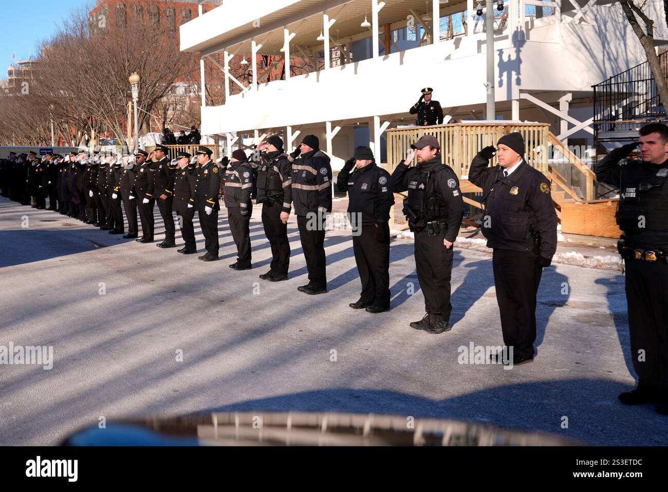 The motorcade with the hearse carrying the flag-draped casket of former ...