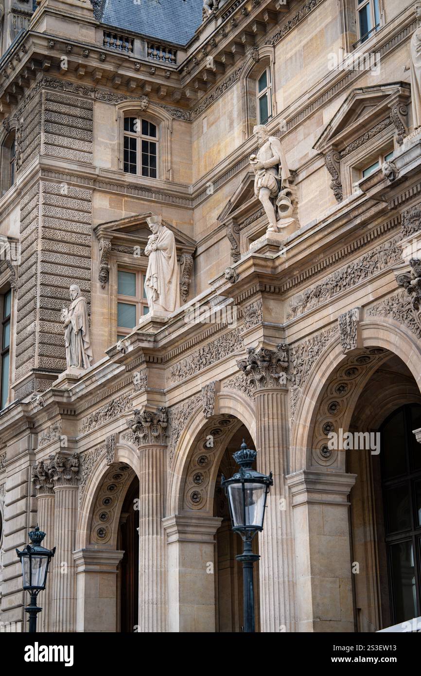 Historic architecture features intricate details of the Louvre Museum ...