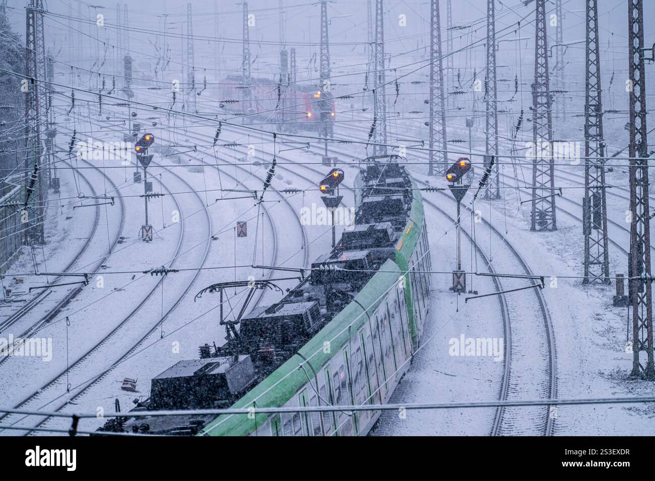 Winter weather, heavy snowfall, railway tracks in front of Essen ...