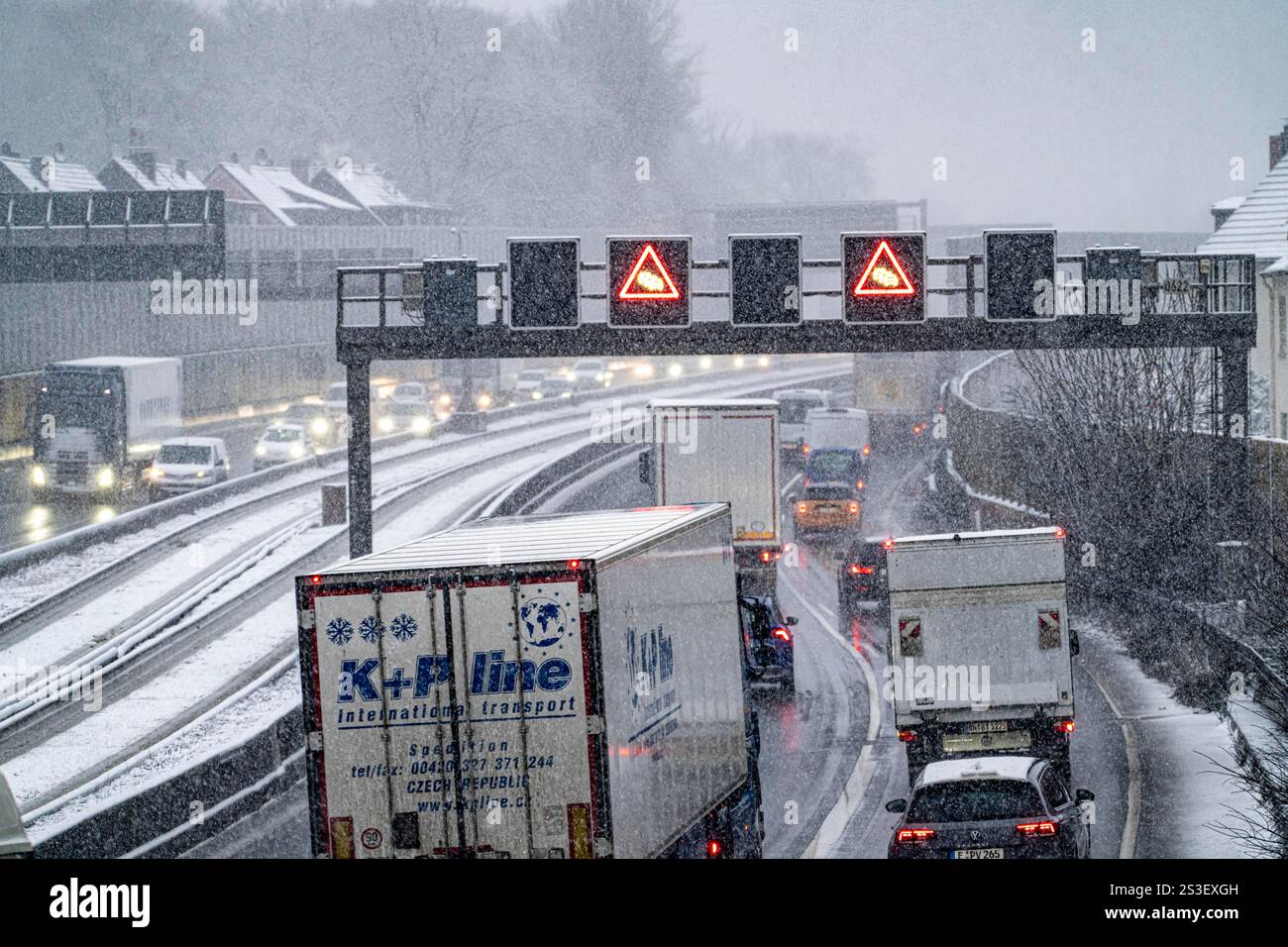 Winter weather, heavy snowfall, traffic jam on the A40 motorway in ...