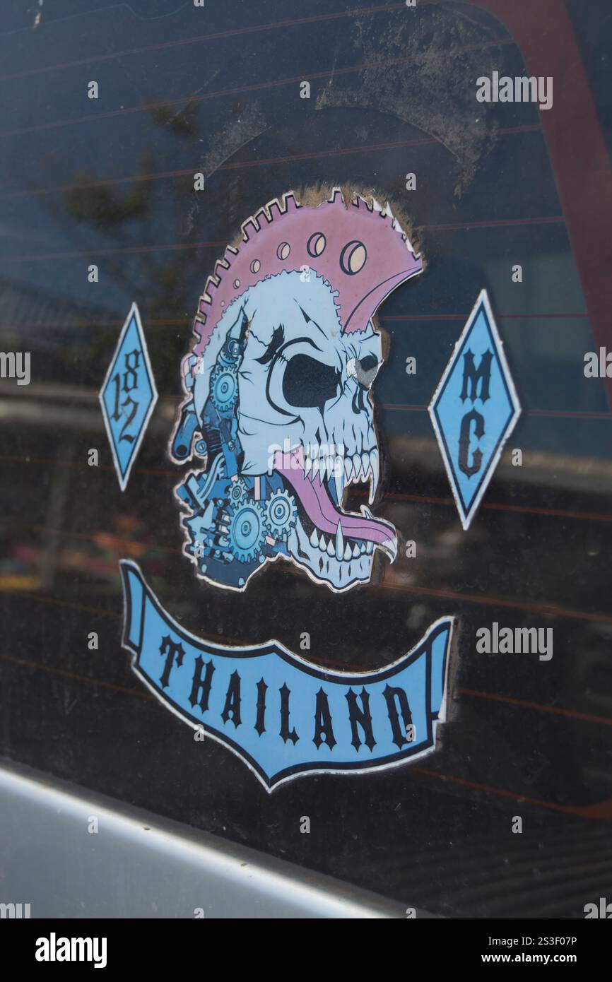 motorcycle club sticker on the rear windscreen of a pick-up truck in ...