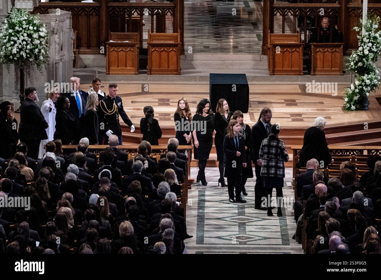Family members arrive at a state funeral for former President Jimmy ...