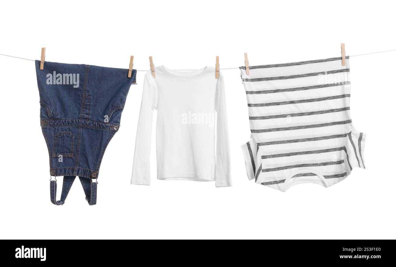 Different clothes drying on laundry line against white background Stock ...