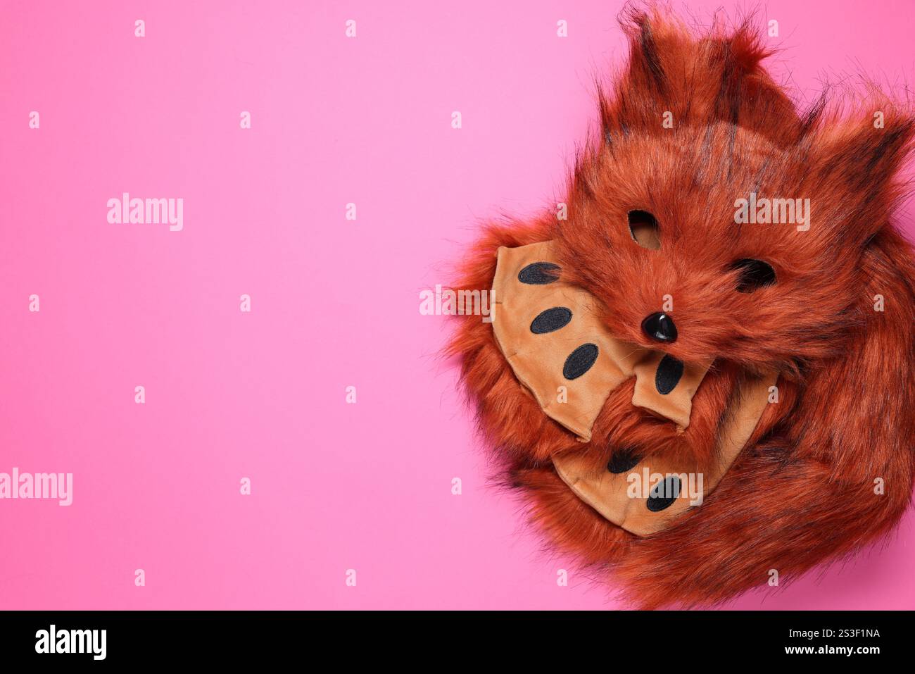 Quadrobics. Fox mask, gloves and tail on pink background, top view ...