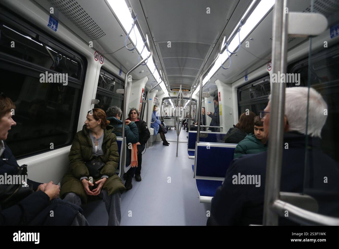 Commuters inside a metro station at the Thessaloniki metro, in ...