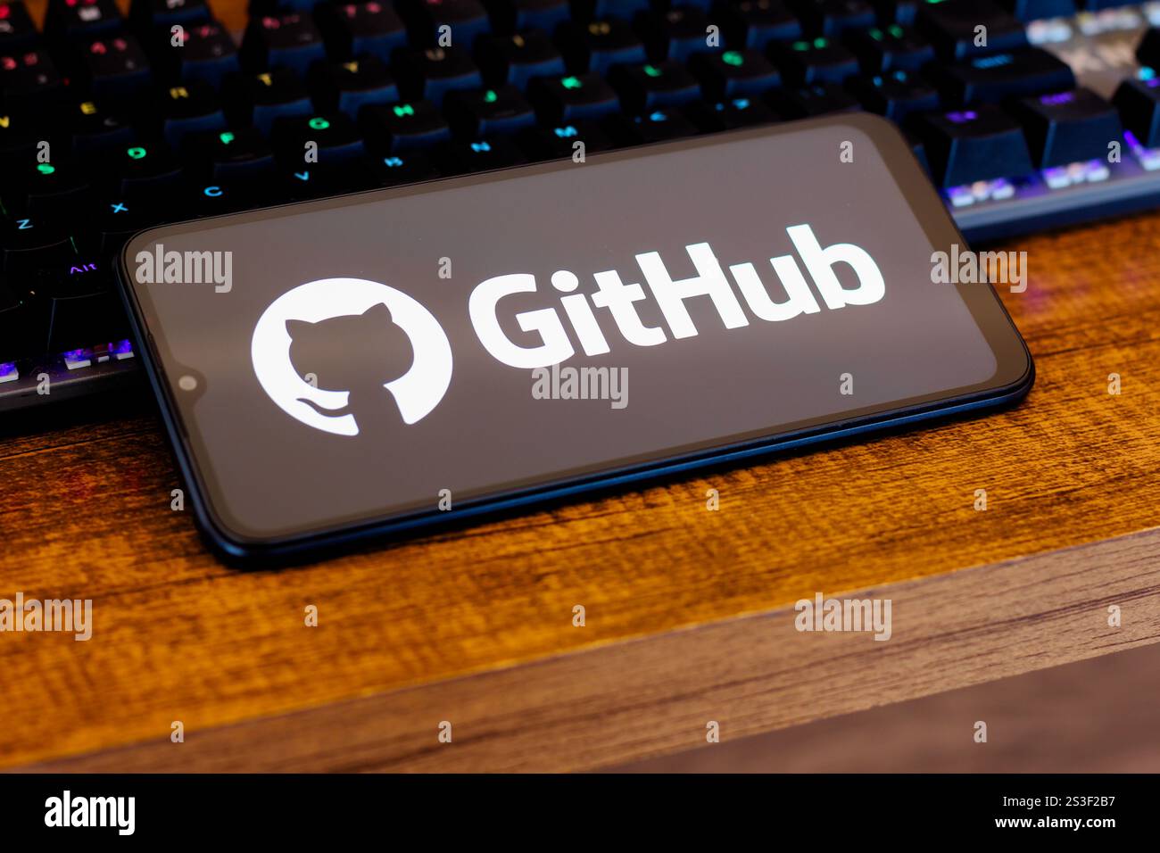 In this photo illustration, the GitHub logo is seen displayed on a ...