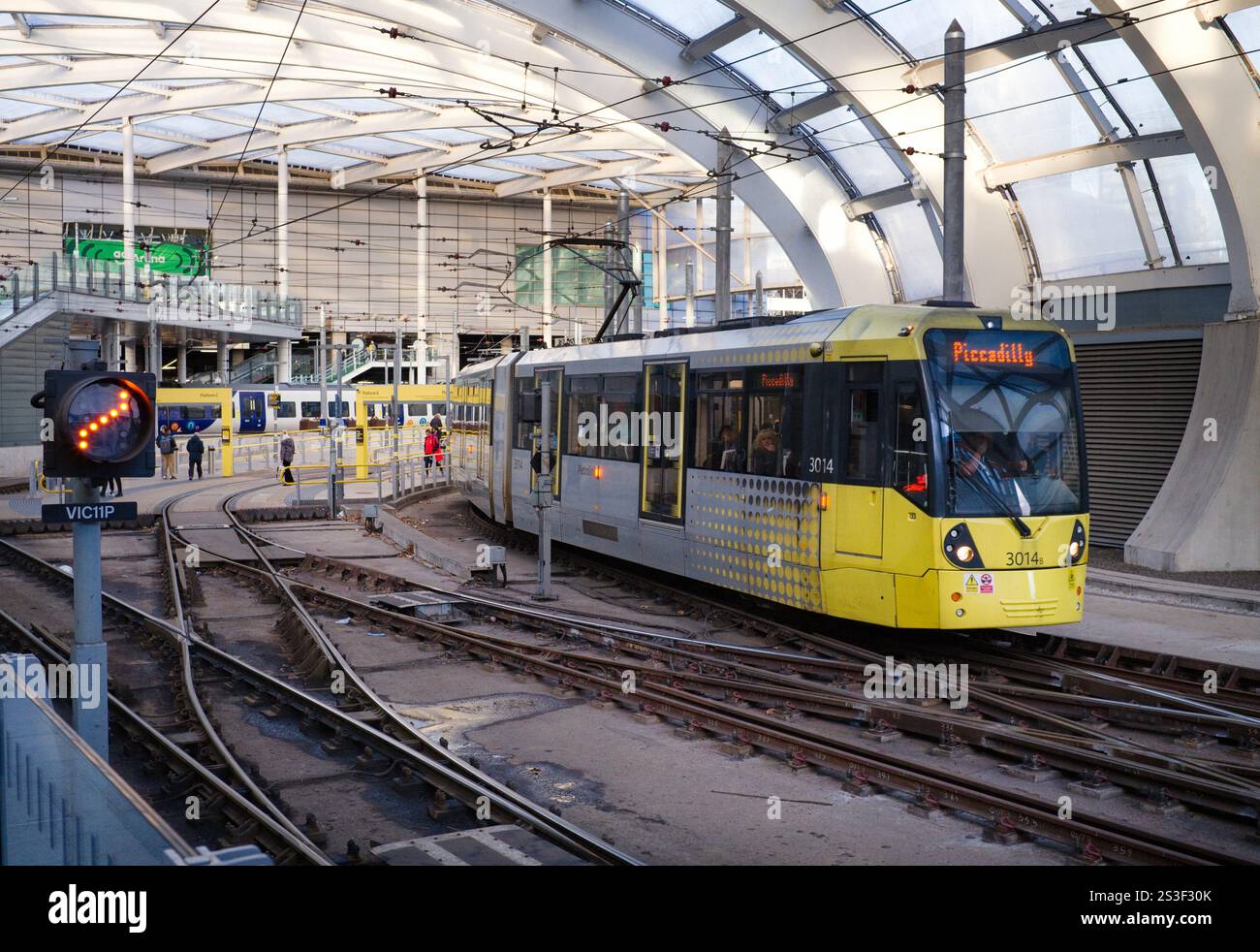 Metro tram leaving Marchester Victoria station Stock Photo - Alamy