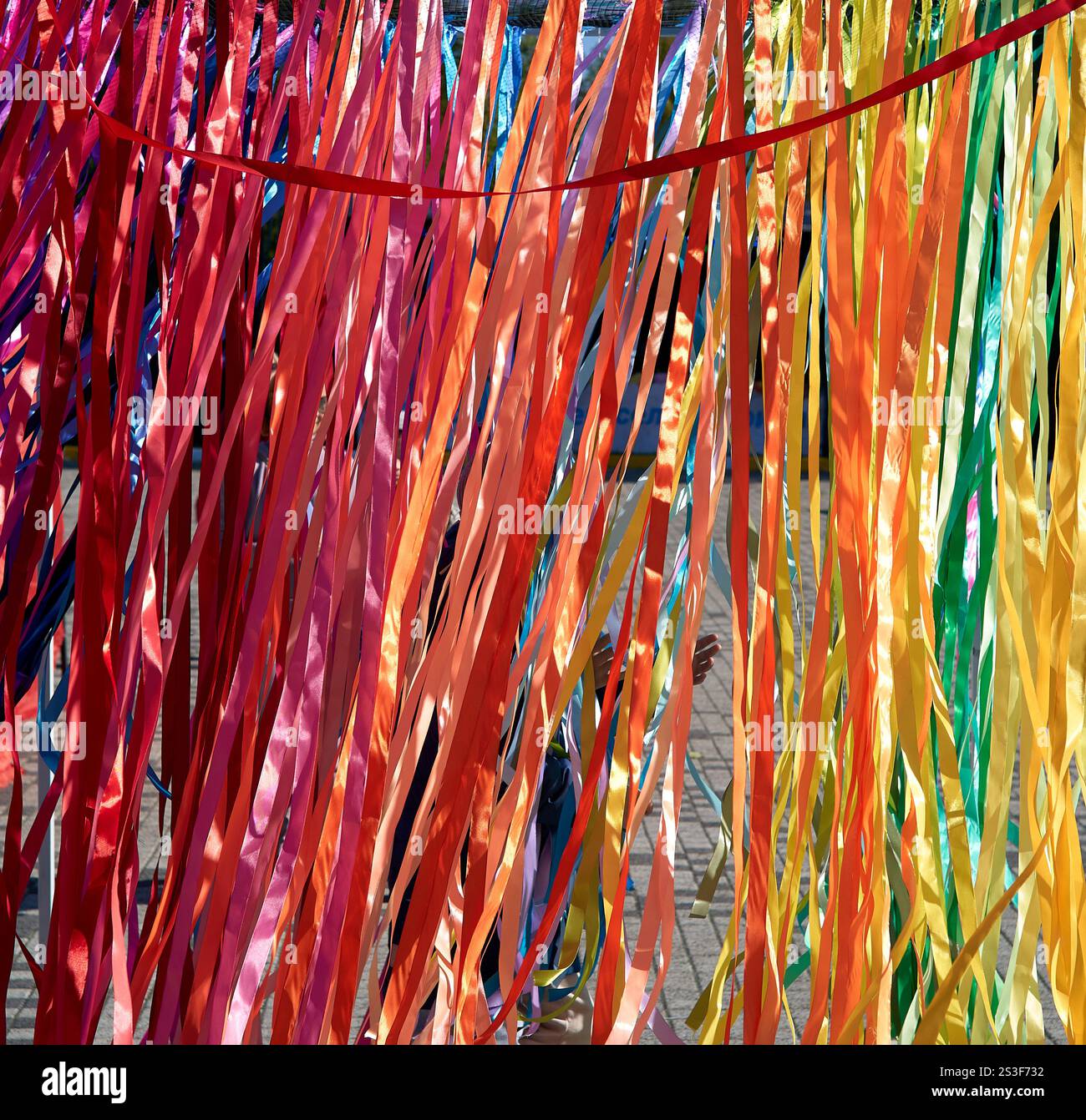 Colorful ribbons on the street. Abstract background Stock Photo - Alamy