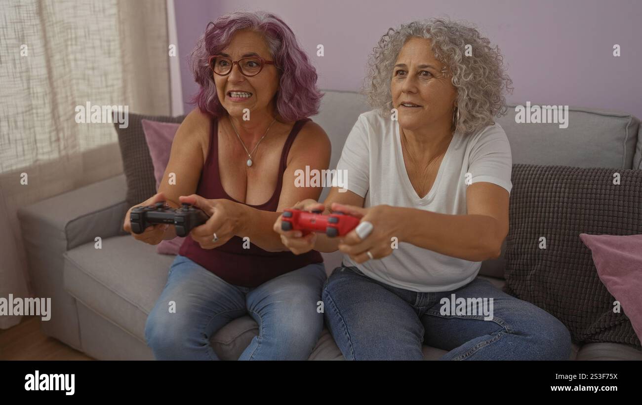 Women playing video games together in a cozy living room showcases ...