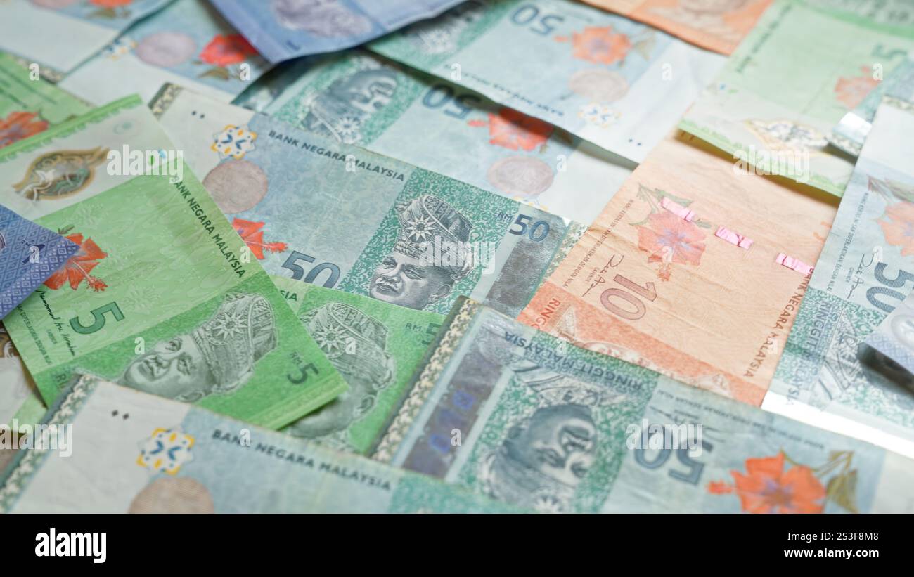 Malaysian banknotes depict various denominations of ringgit currency ...