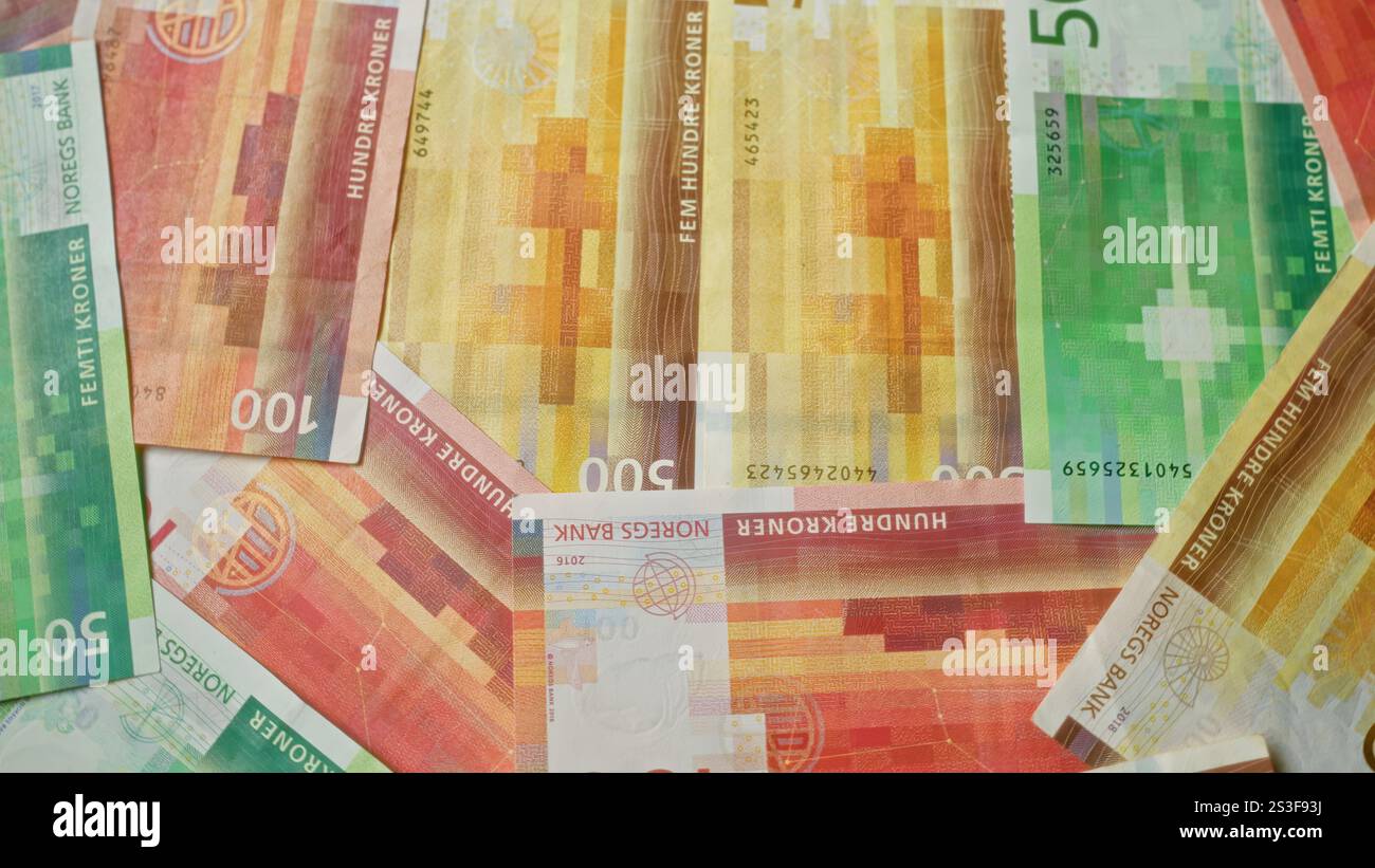 Spread of colorful norwegian banknotes featuring various denominations ...