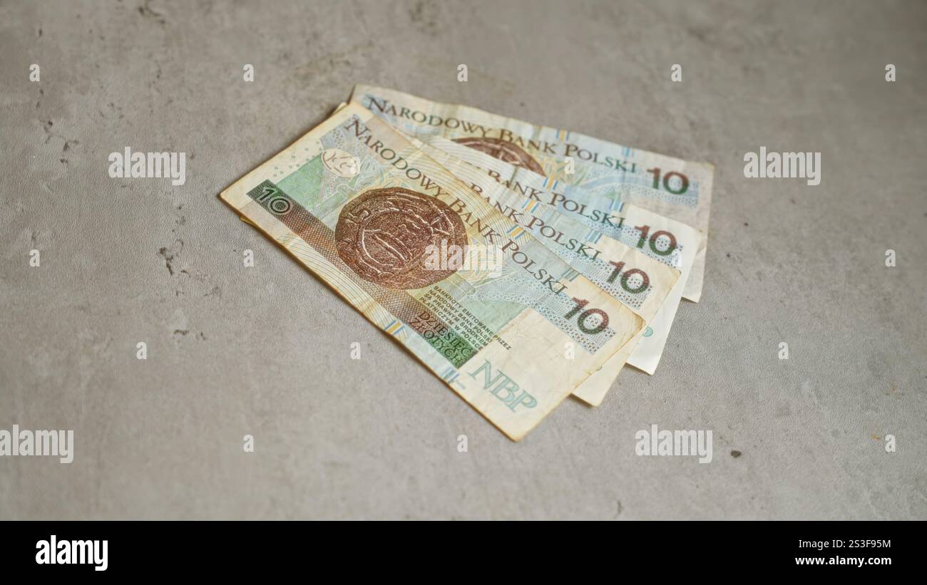 Polish zloty banknotes set on a concrete surface illustrating currency ...