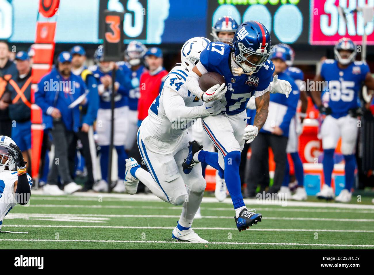New York Giants wide receiver Wan'Dale Robinson (17) is pursued by ...